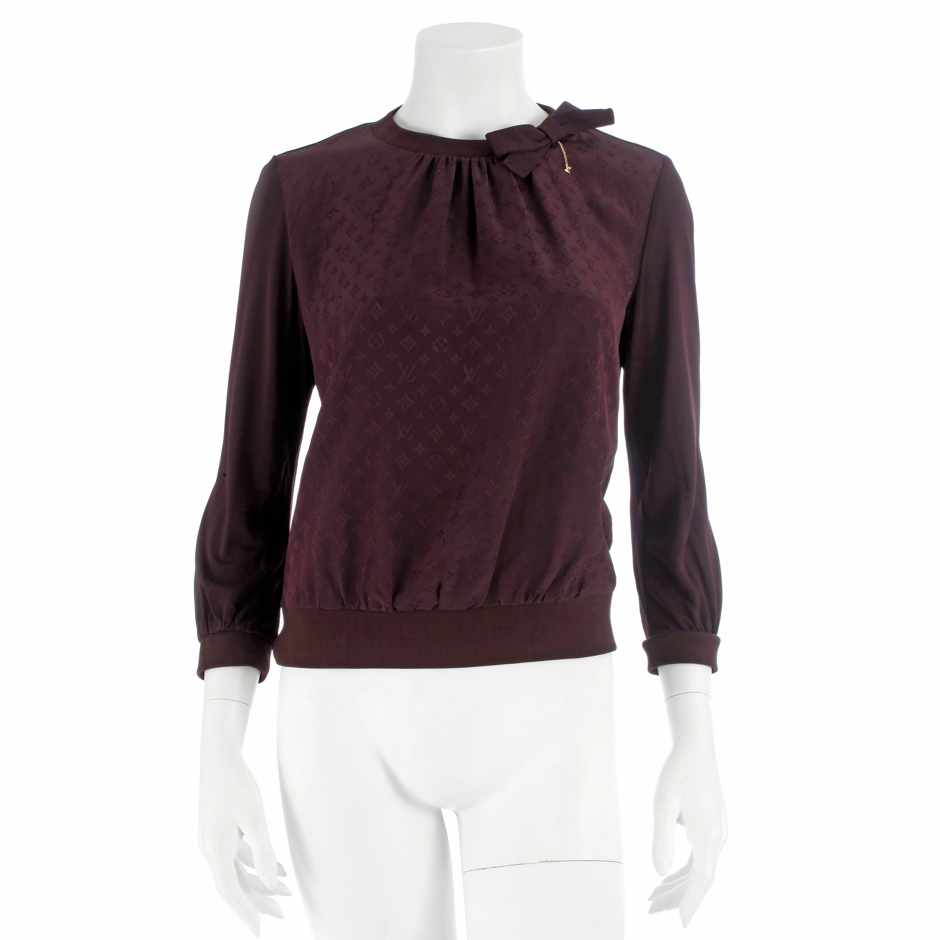 LOUIS VUITTON, a burgundy red monogrammed blouse, size 38. - Bukowskis
