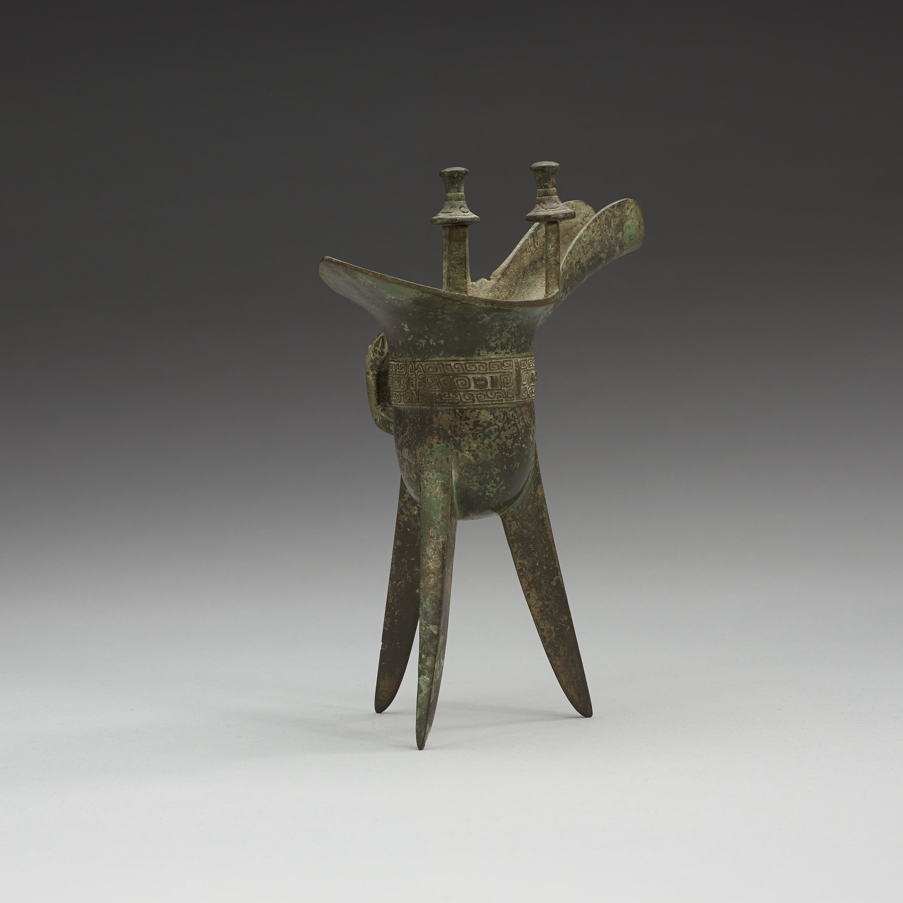 An archaic bronze ritual libation vessel (Jue), presumably Shang ...