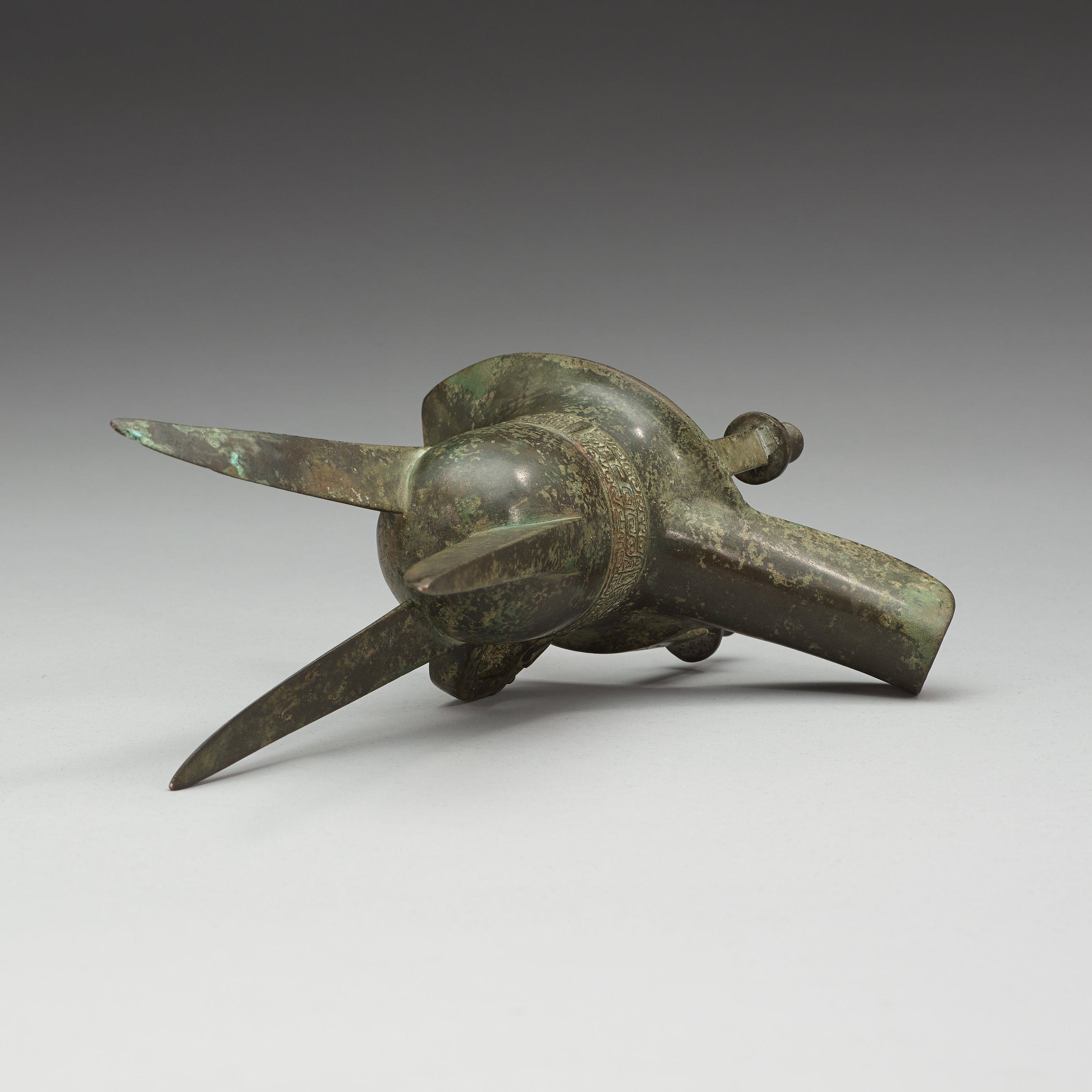 An archaic bronze ritual libation vessel (Jue), presumably Shang ...