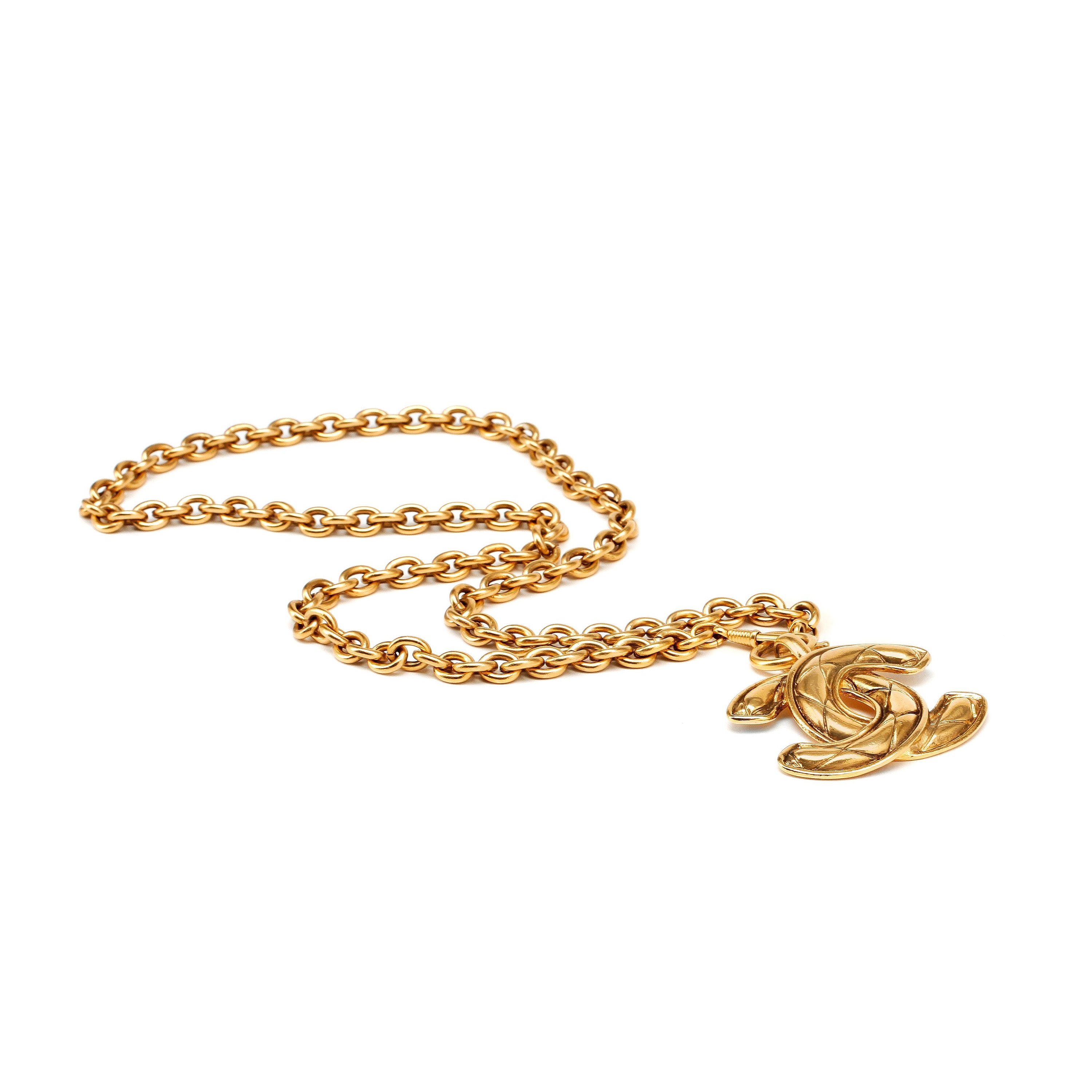 CHANEL a gold colored chain with pendant. - Bukowskis