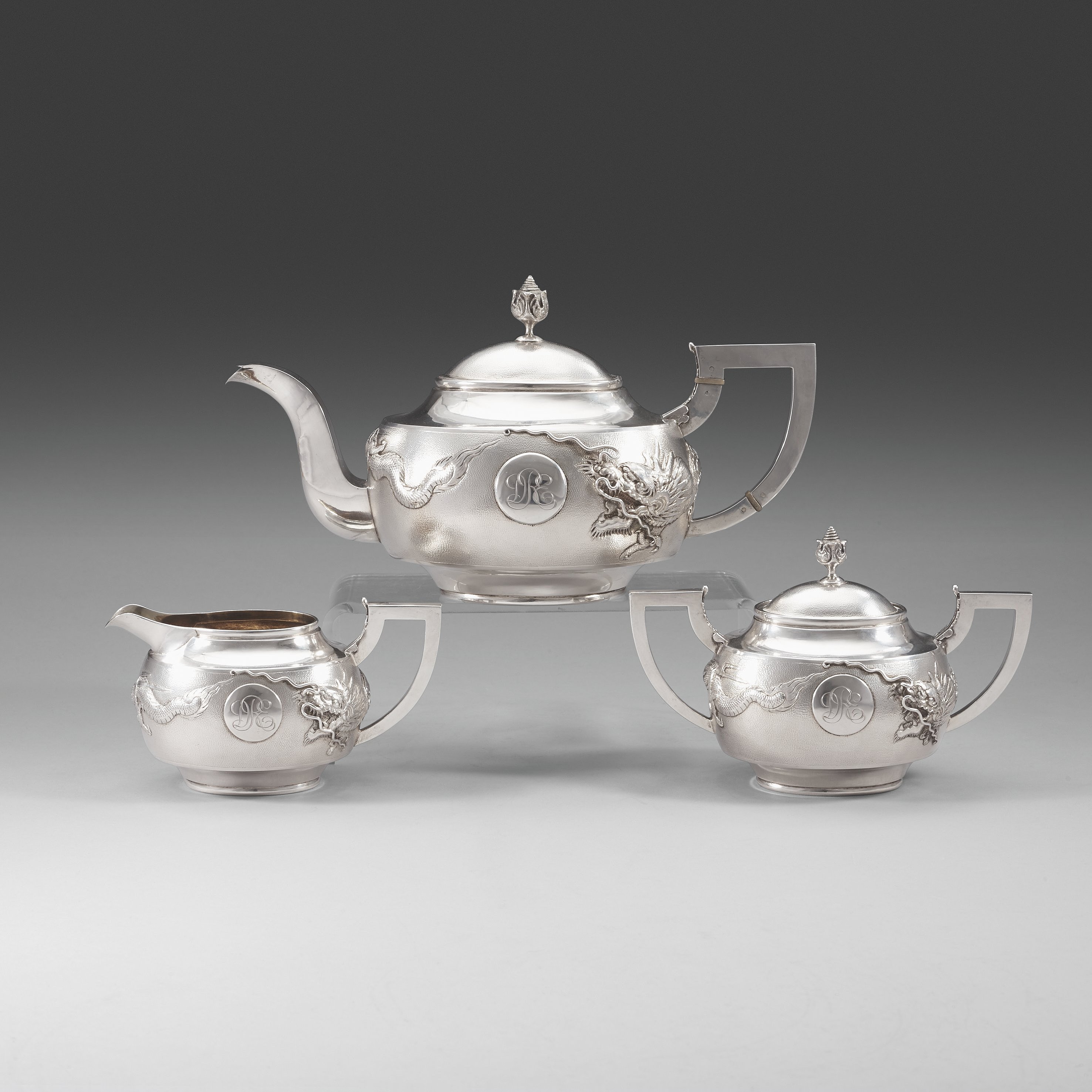 A Chinese three-piece silver tea set, unidentified master, early 20th ...