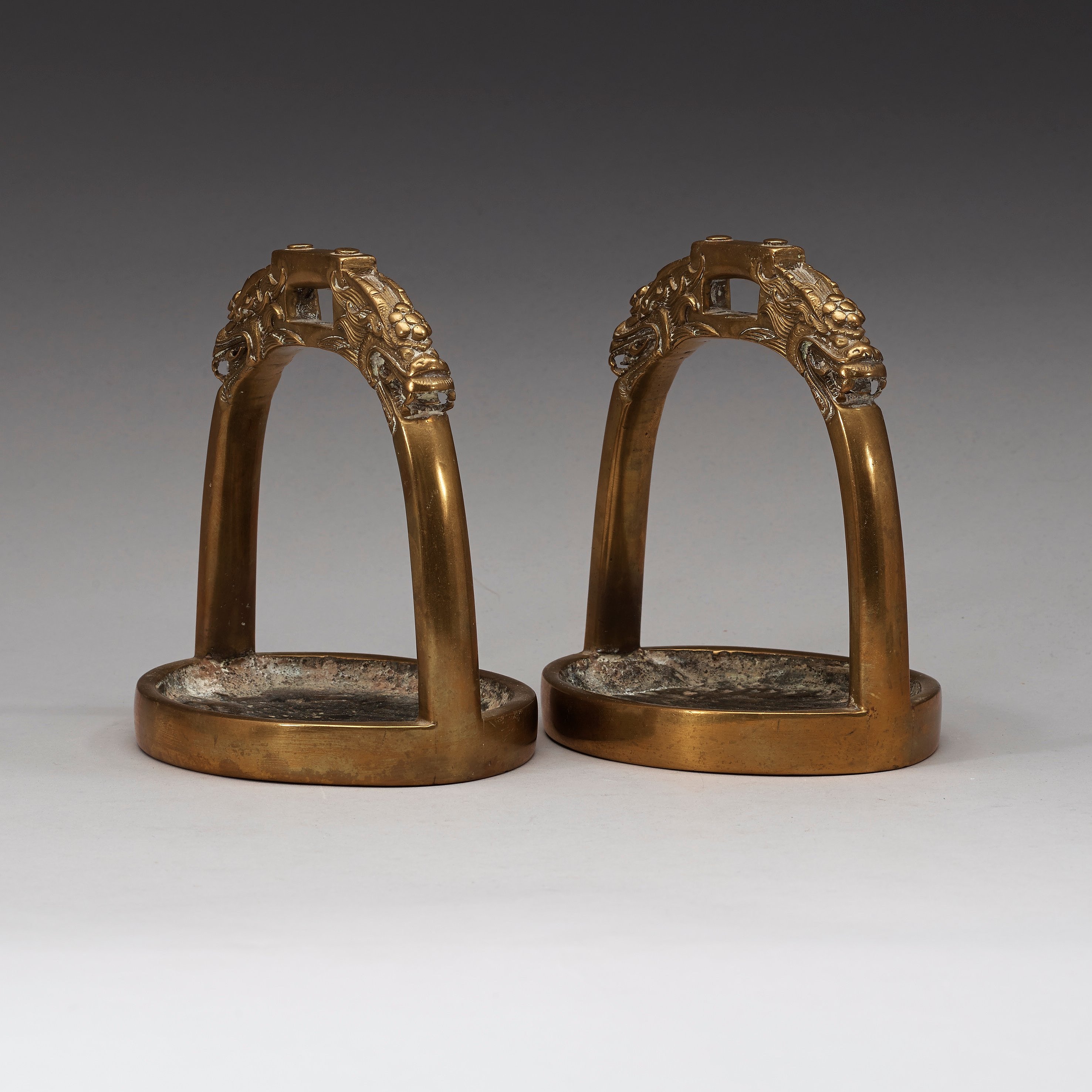 A pair of bronze stirrups, Qing dynasty, 19th Century. - Bukowskis