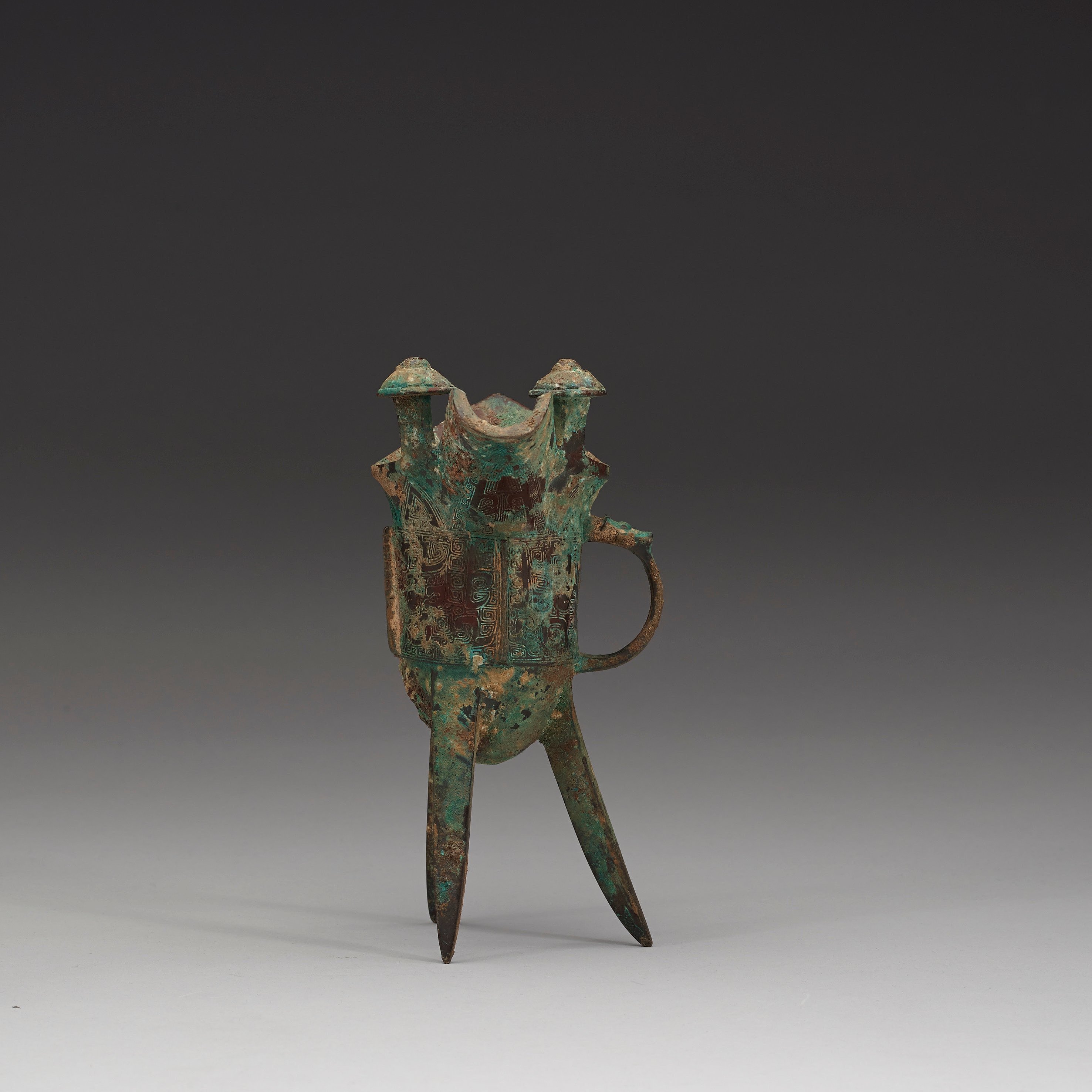 An archaic bronze ritual libation vessel (Jue), presumably Shang ...