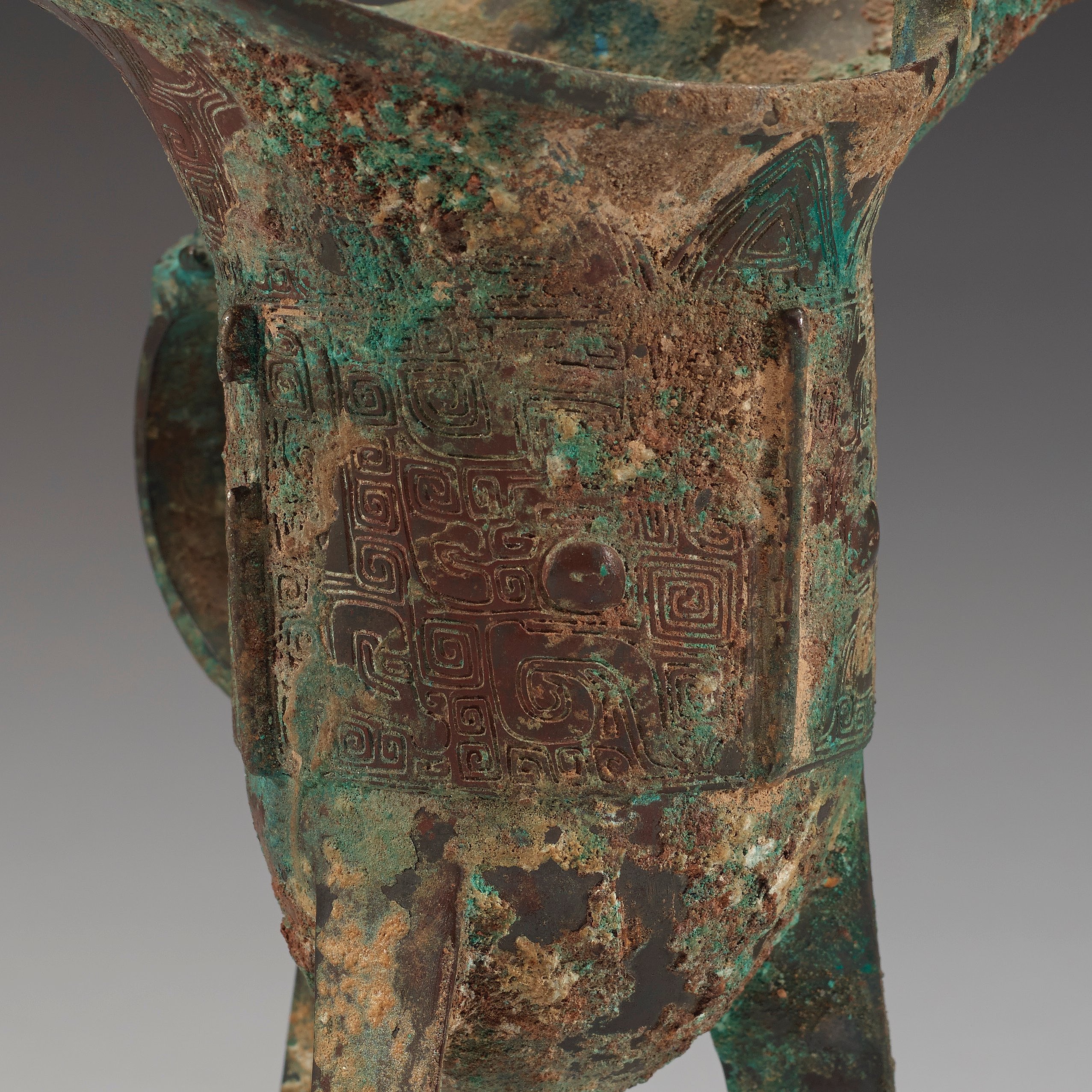 An archaic bronze ritual libation vessel (Jue), presumably Shang ...