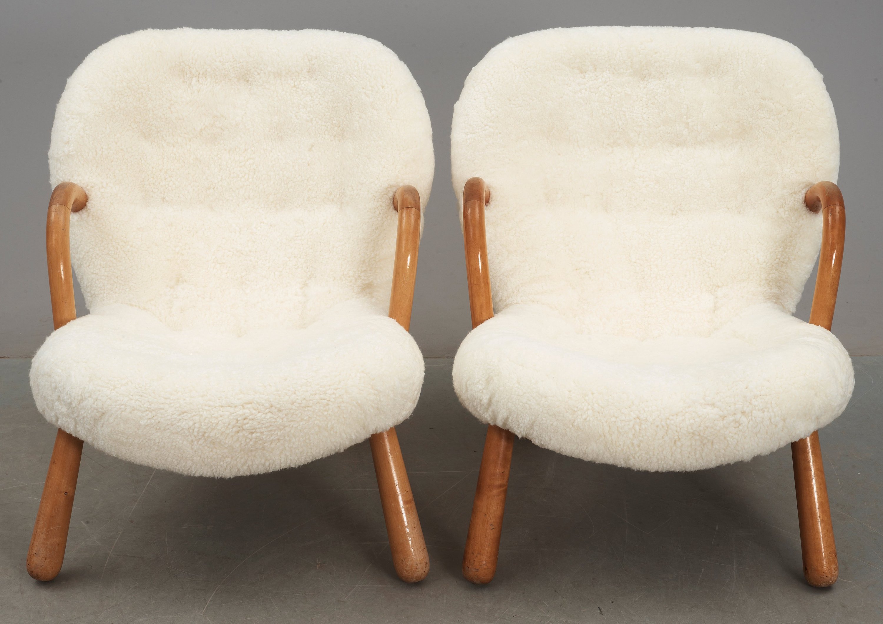 A pair of 'Clam' easy chairs attributed to Philip Arctander, 1940's-50 ...