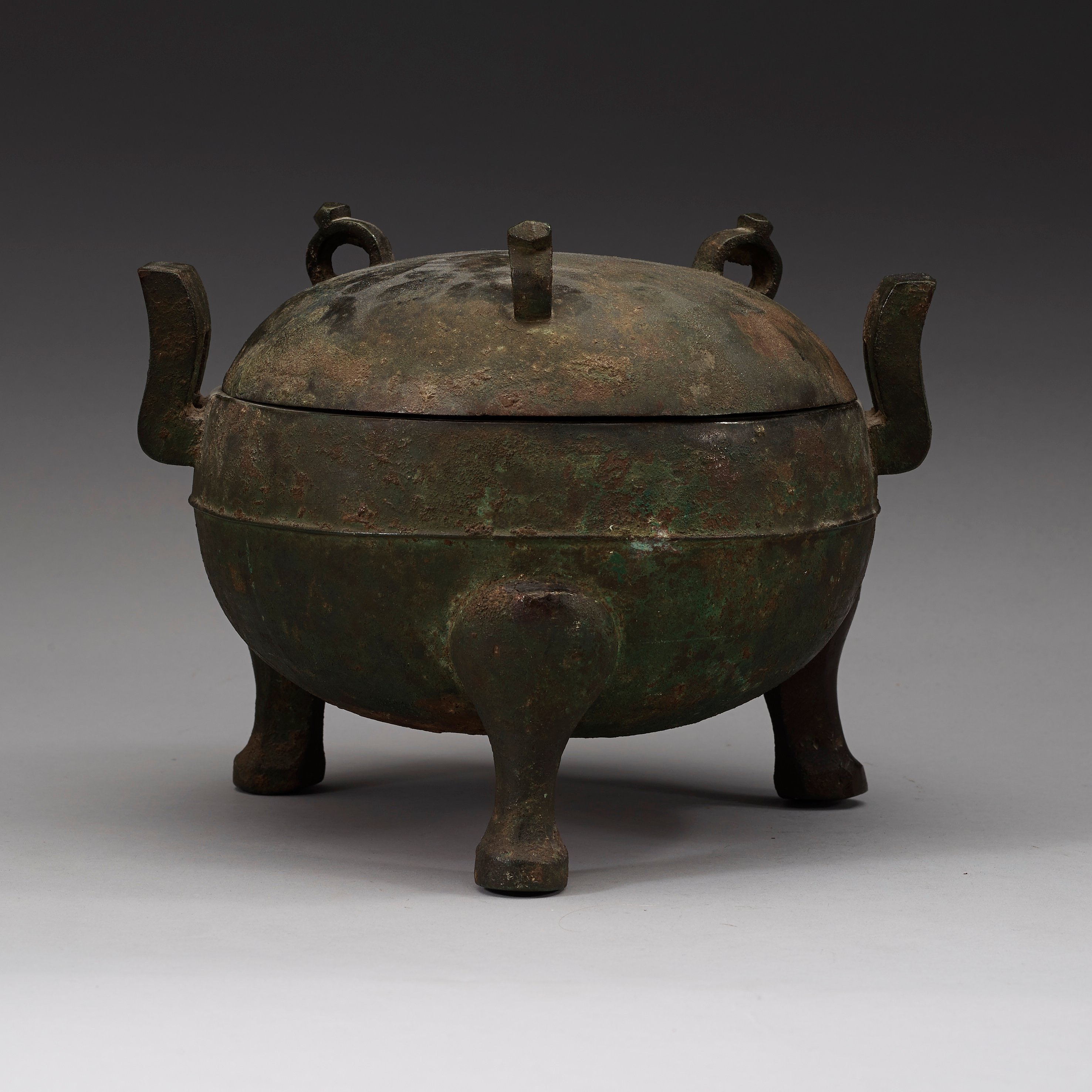 A bronze ding tripod censer with cover, presumably Han dynasty (206 BC ...