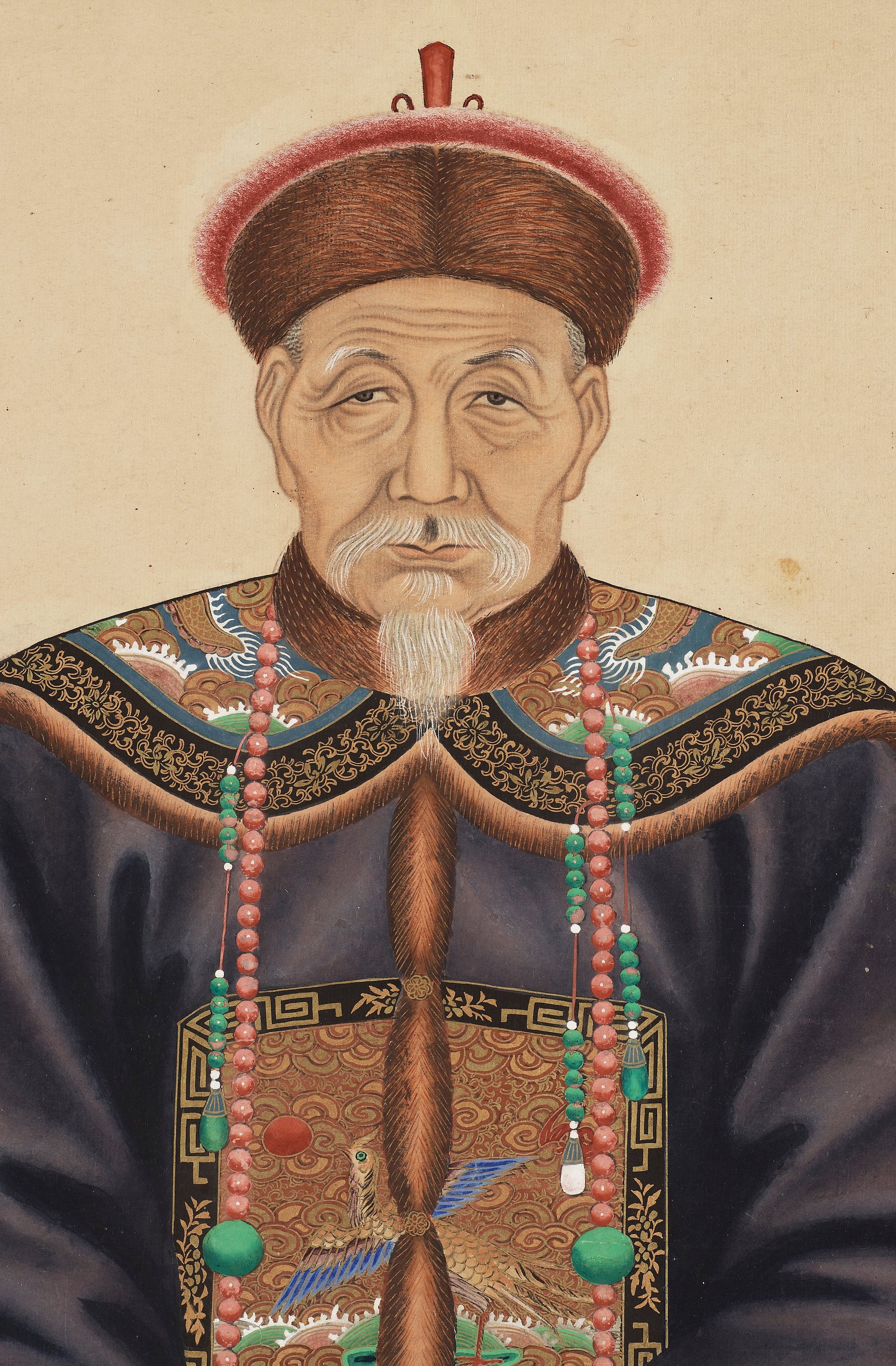 A hanging scroll of a well painted ancestral portrait, late Qing ...