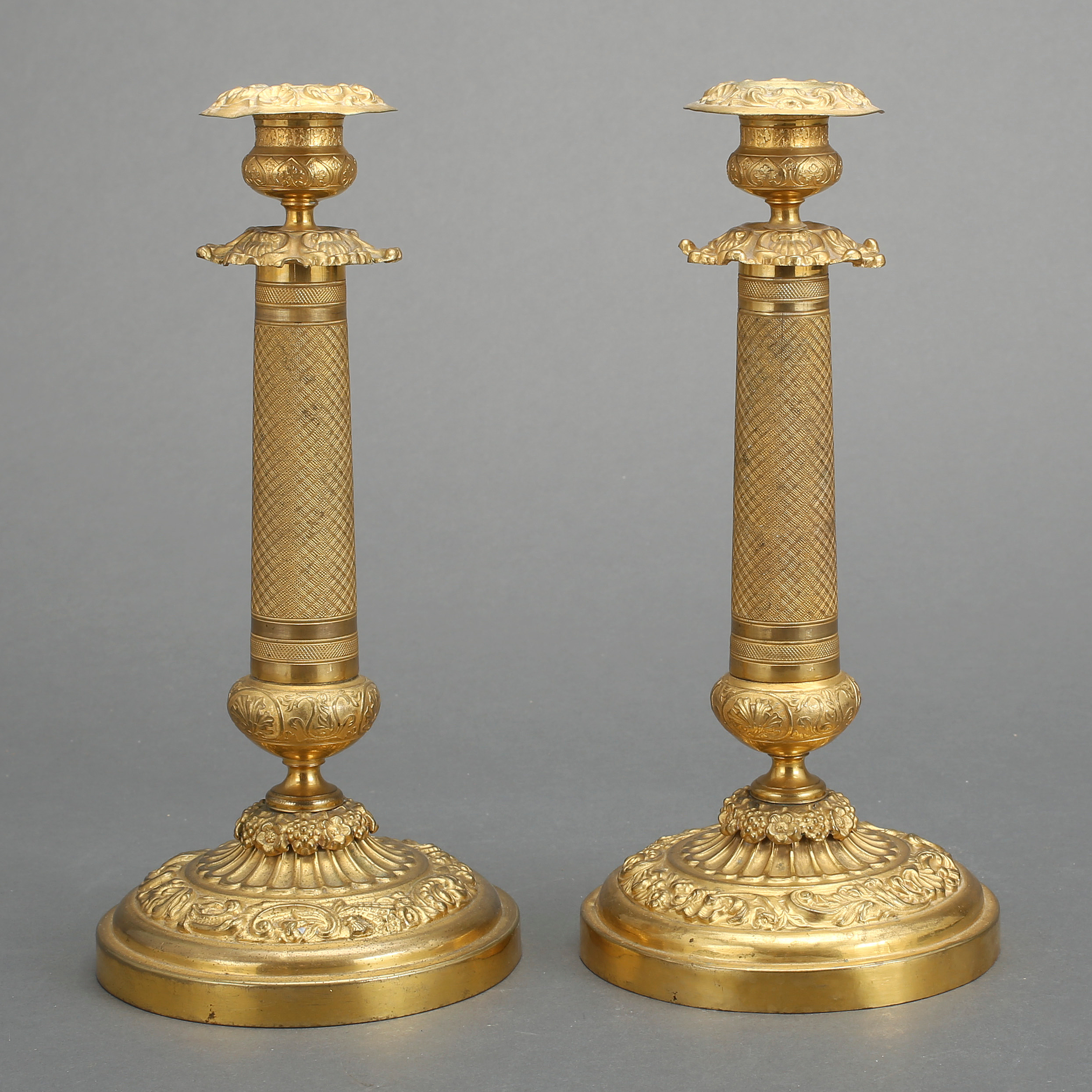 A pair of Russian 1830/40's brass candlesticks. - Bukowskis