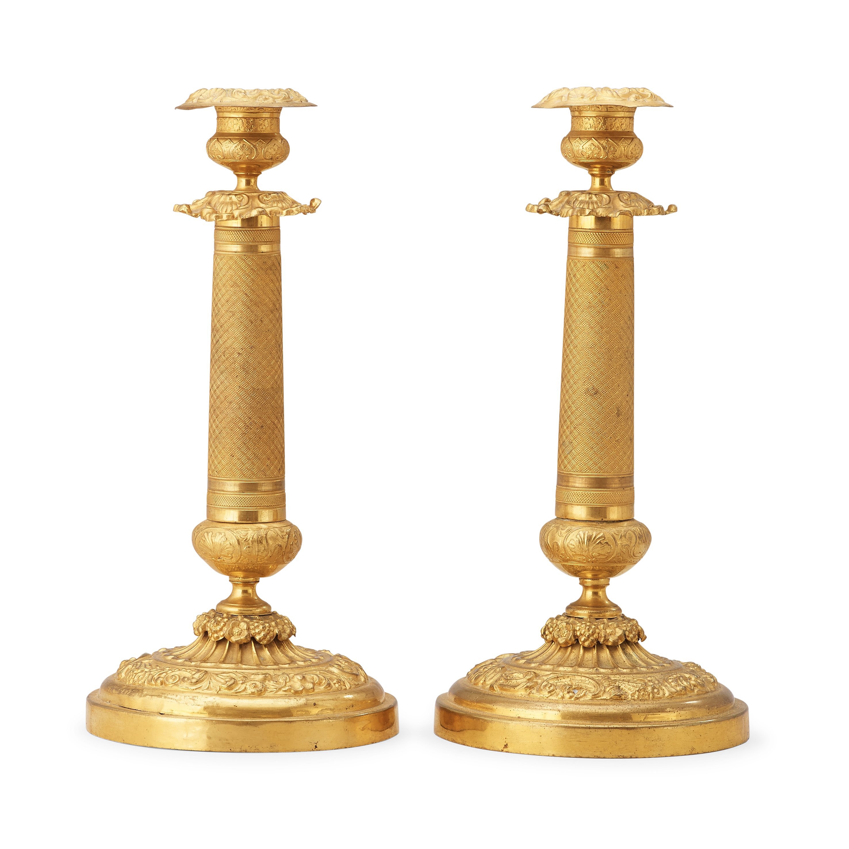 A pair of Russian 1830/40's brass candlesticks. - Bukowskis