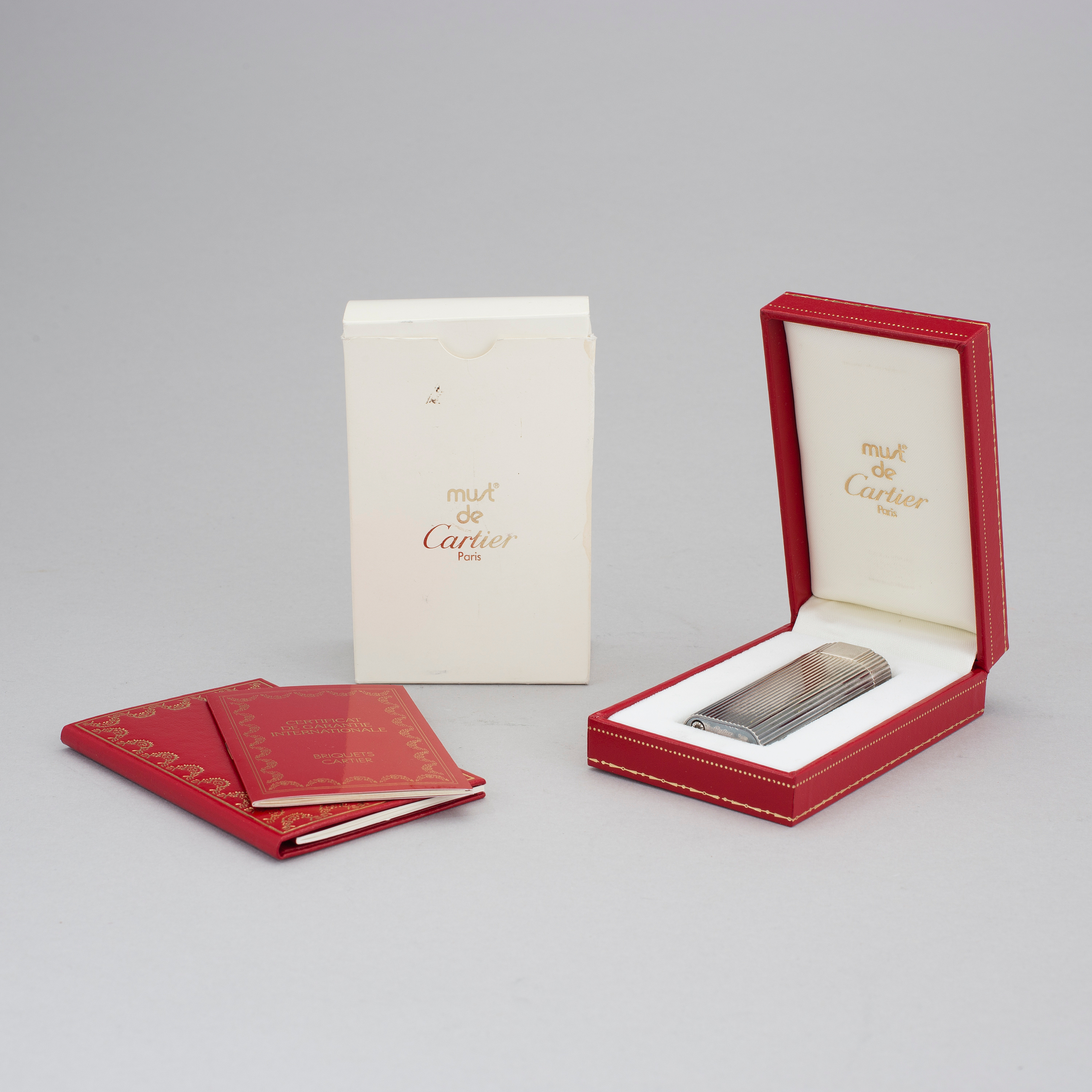 A must de Cartier silver plated cigarette lighter. - Bukowskis