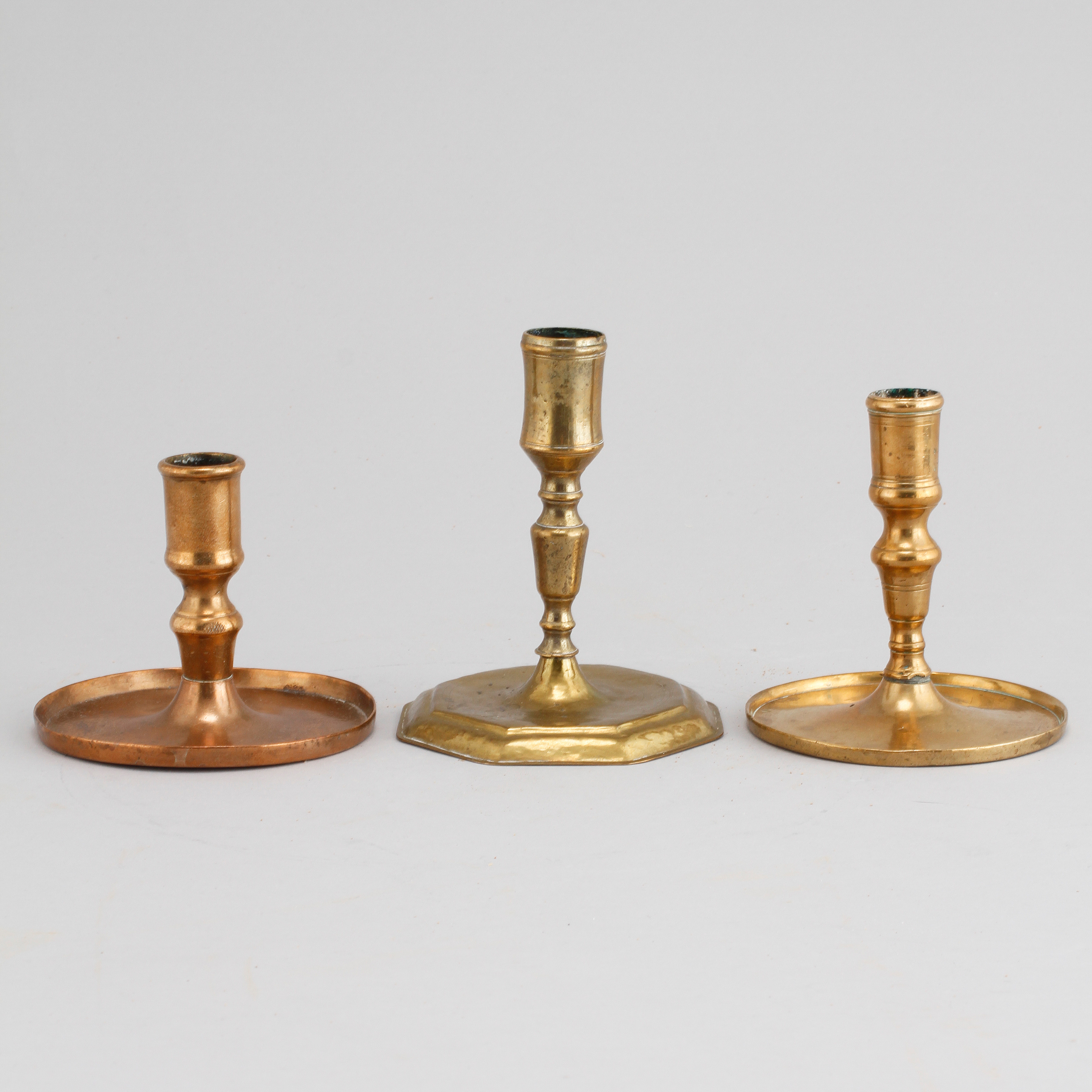 Three candlesticks made of brass from the 18th century. - Bukowskis