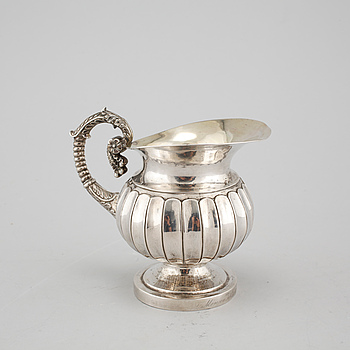 A silver CREAM JUG made by Carl Petter Norlin from Malmö in 1838 ...