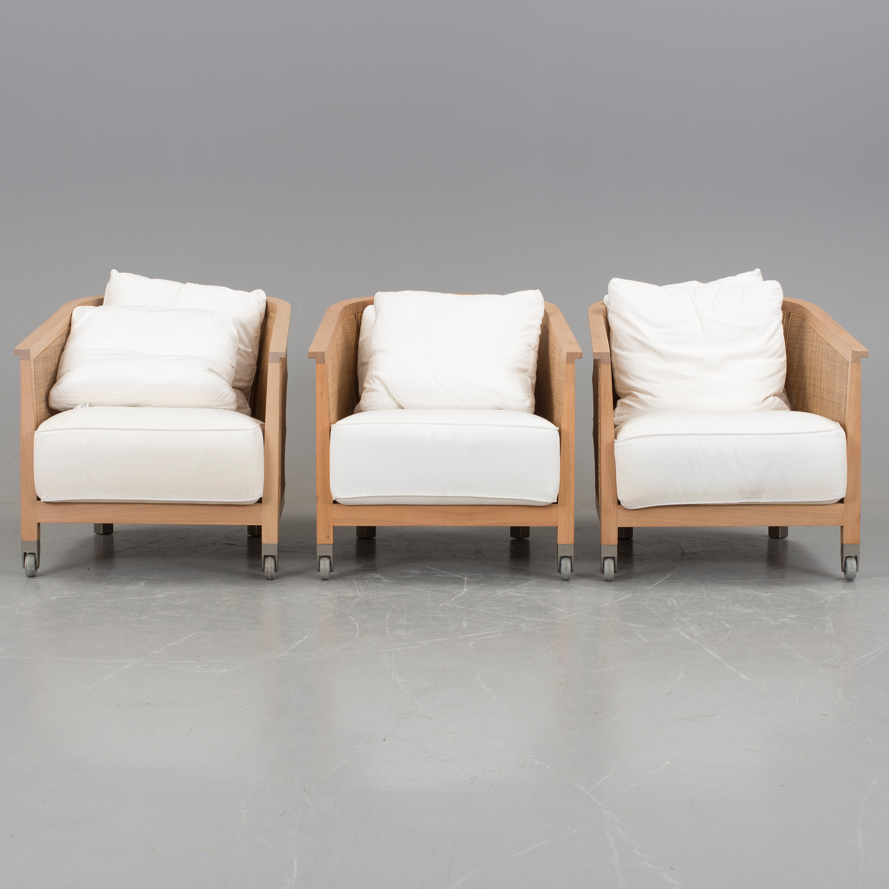 Three 'Mozart', armchairs manufactured by Flexform. - Bukowskis