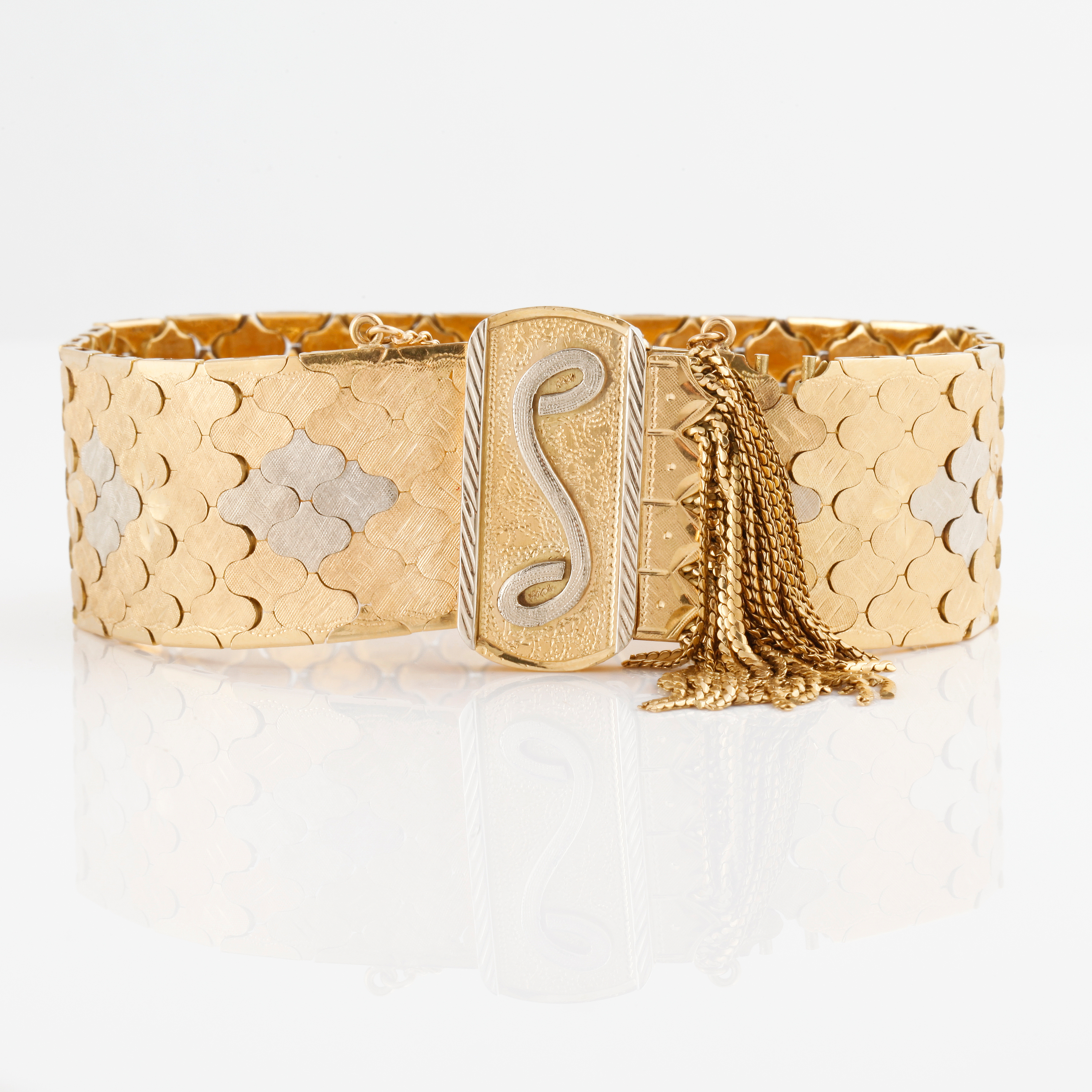 An tricolor gold bracelet with Italian hallmarks. - Bukowskis