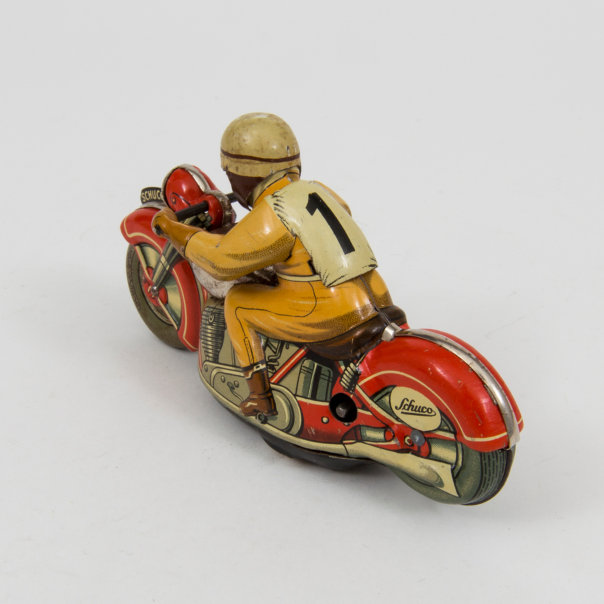 A Schuco Mirakomot 1012 motorcycle and Varianto 3010, Germany c. 1950 ...