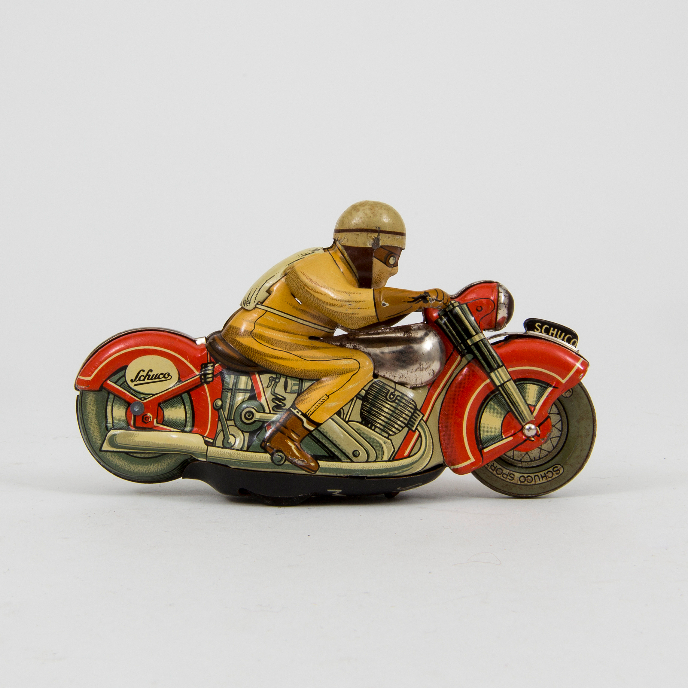 A Schuco Mirakomot 1012 motorcycle and Varianto 3010, Germany c. 1950 ...