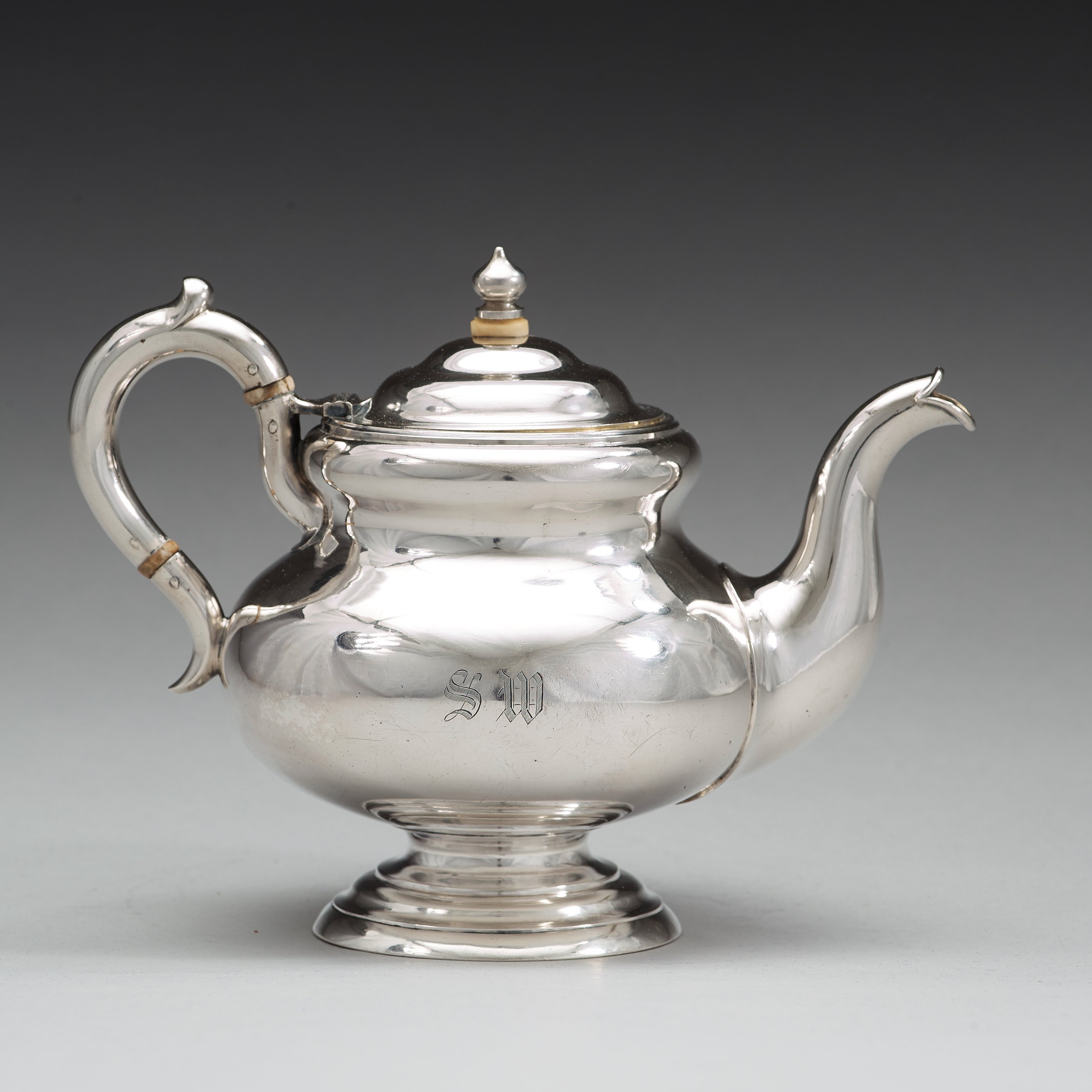 A Russian mid 19th century parcel-gilt tea-pot, mark of Michael Peippo ...