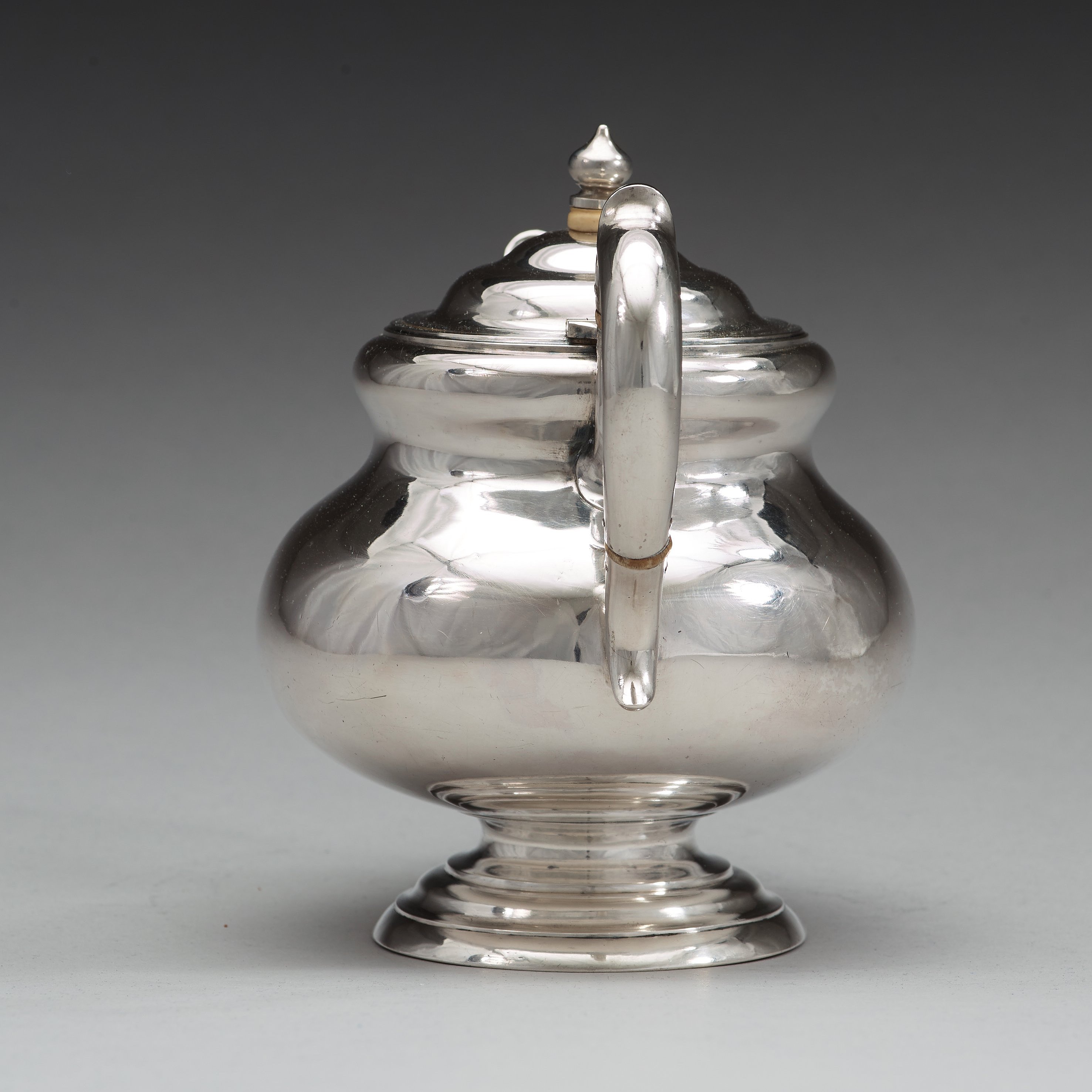 A Russian mid 19th century parcel-gilt tea-pot, mark of Michael Peippo ...