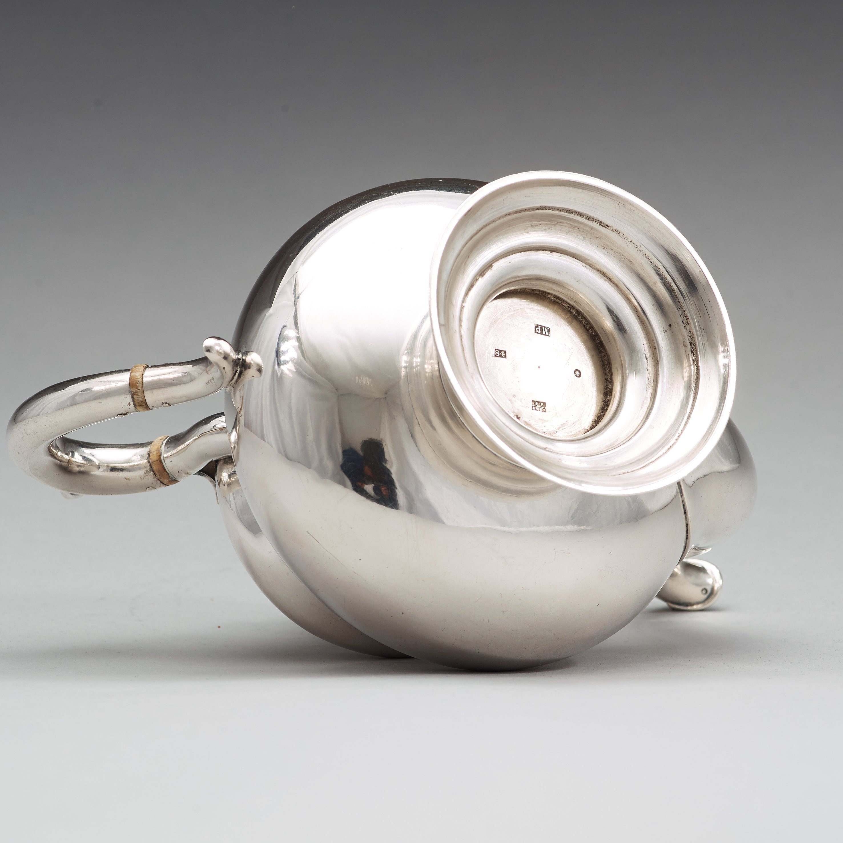 A Russian mid 19th century parcel-gilt tea-pot, mark of Michael Peippo ...