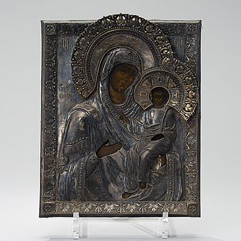 A RUSSIAN ICON, tempera on wood panel, RIZA, silver S:t Petersburg 1828 ...