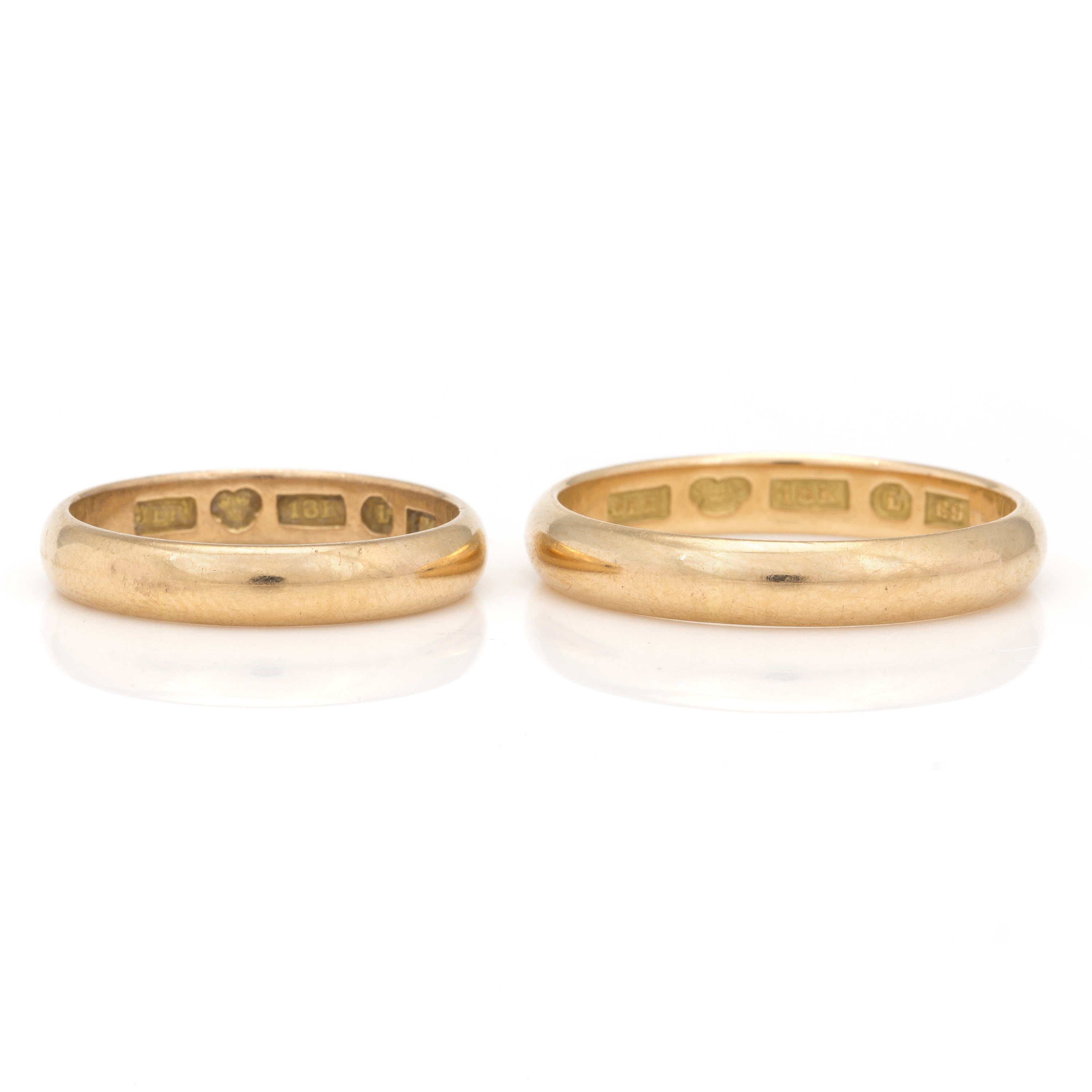 Two 18K gold rings. - Bukowskis