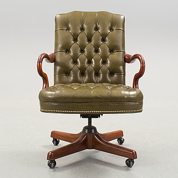 A Chesterfield style sweivel chair, Alex Stuart Design Inc, Chatsworth ...