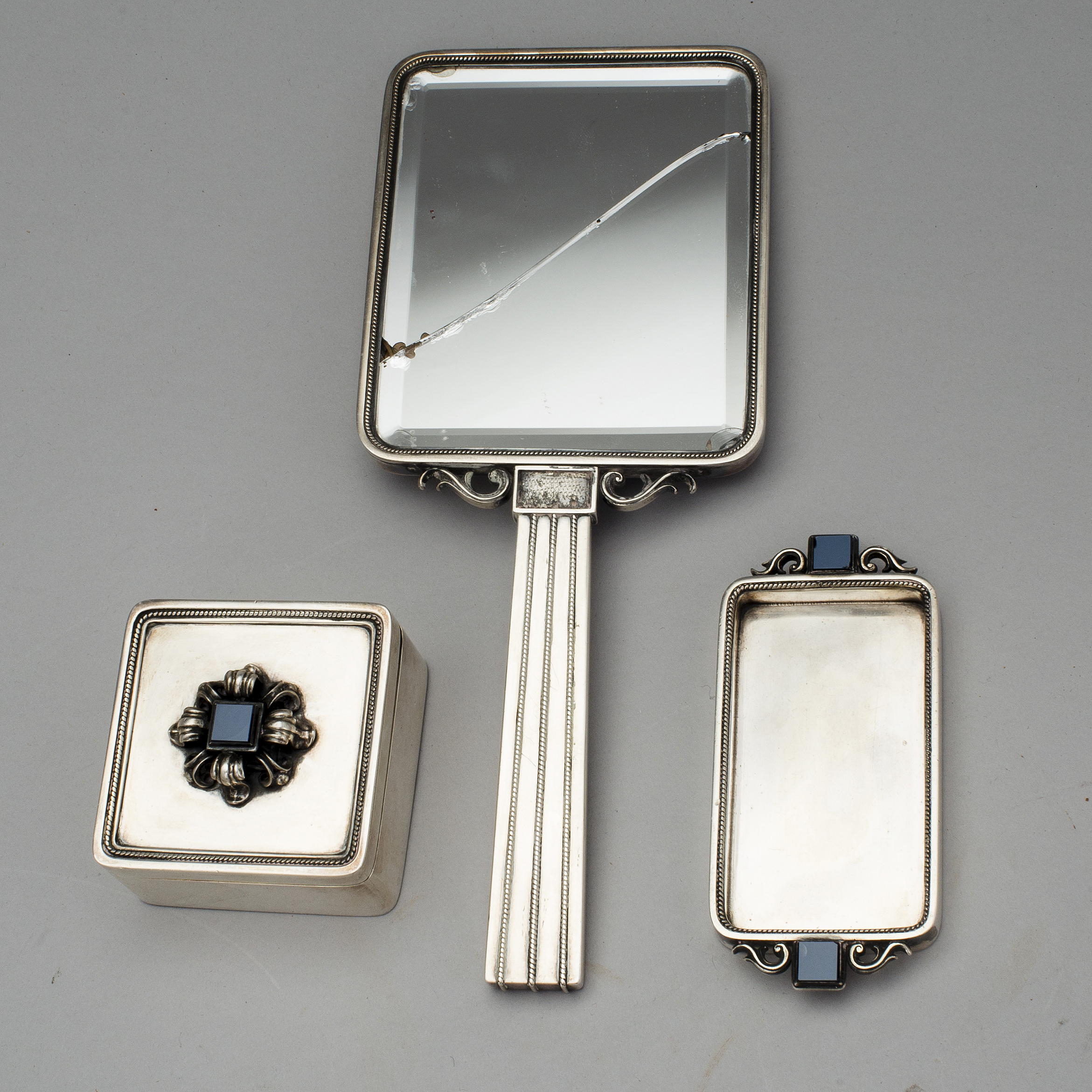 Hand mirror, needle tray and box in silver designed by Helge Lindgren ...