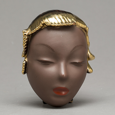 A Rudolf Knörlein Goldscheider terrracota wall mask, 1950'. - Bukowskis
