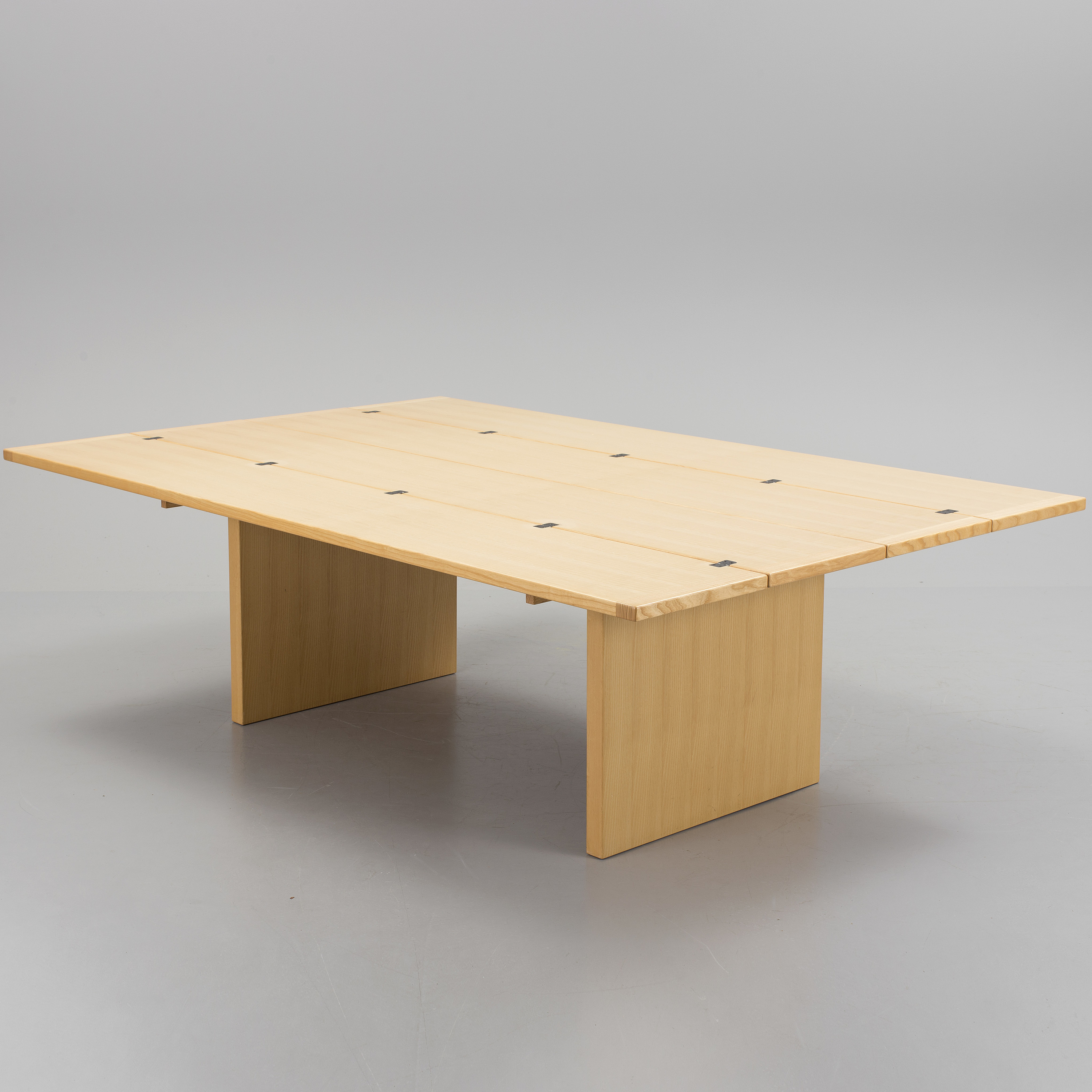 A "La Barca" table in ash, designed by Piero De Martini for Cassina ...