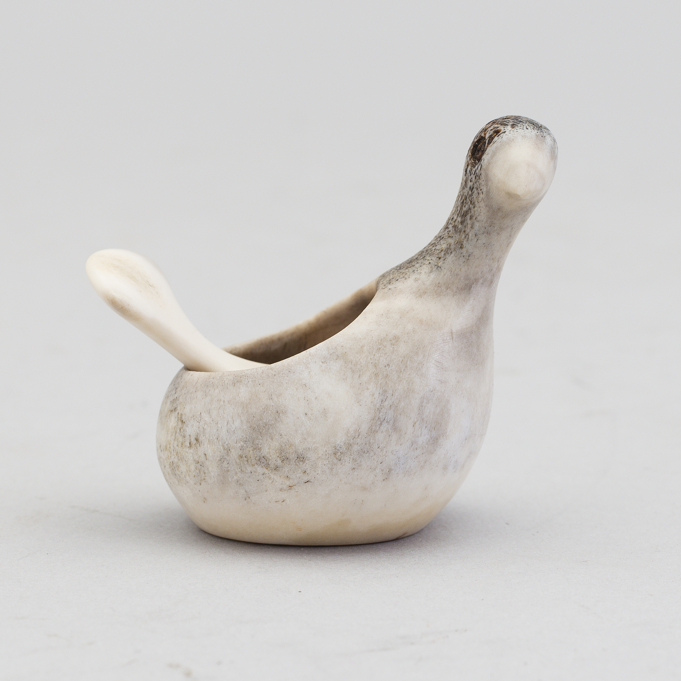 LARS PIRAK, a salt stand in the shape of a bird. Signed and dated -93 ...