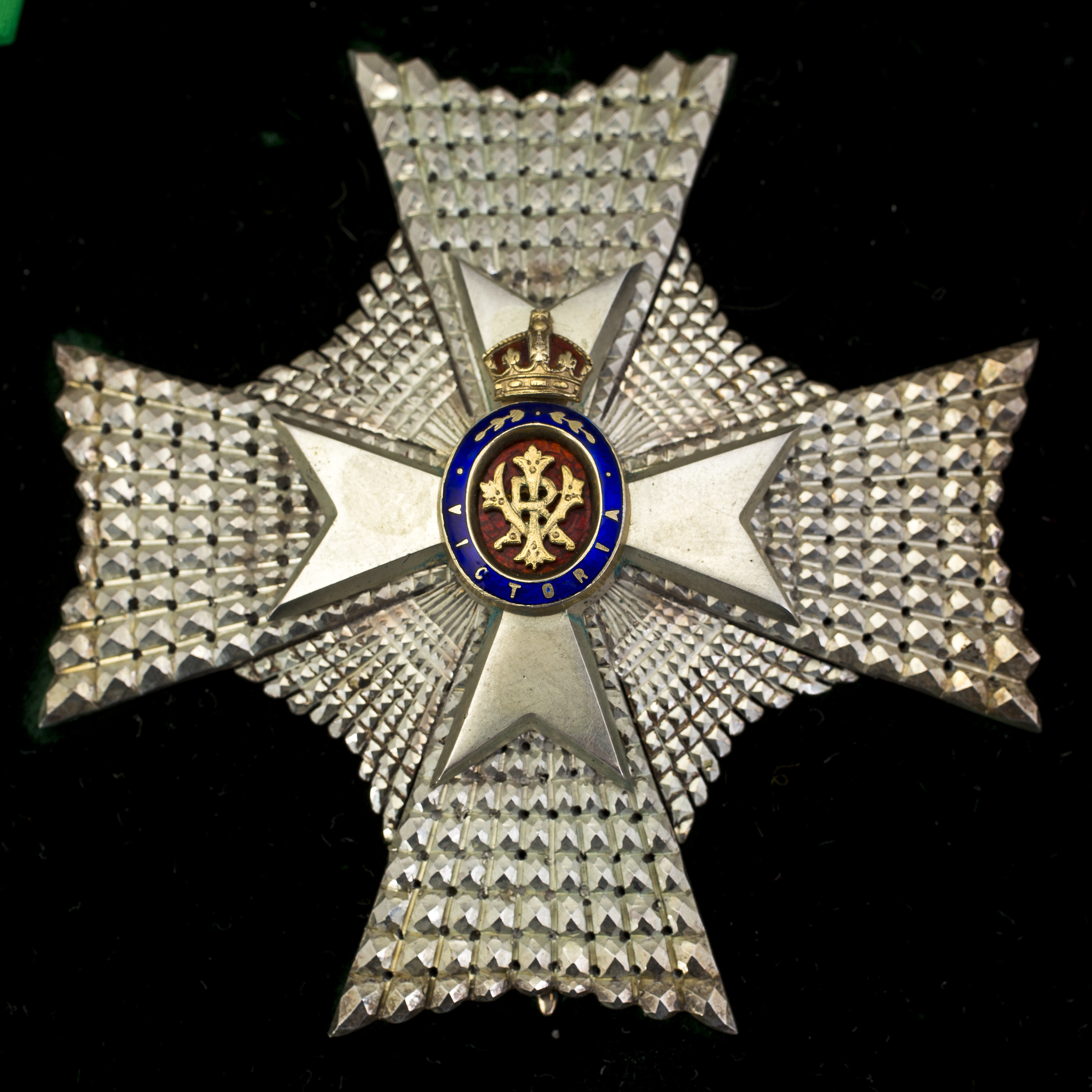 A set of a knights commander cross and breast star The Royal Victorian ...