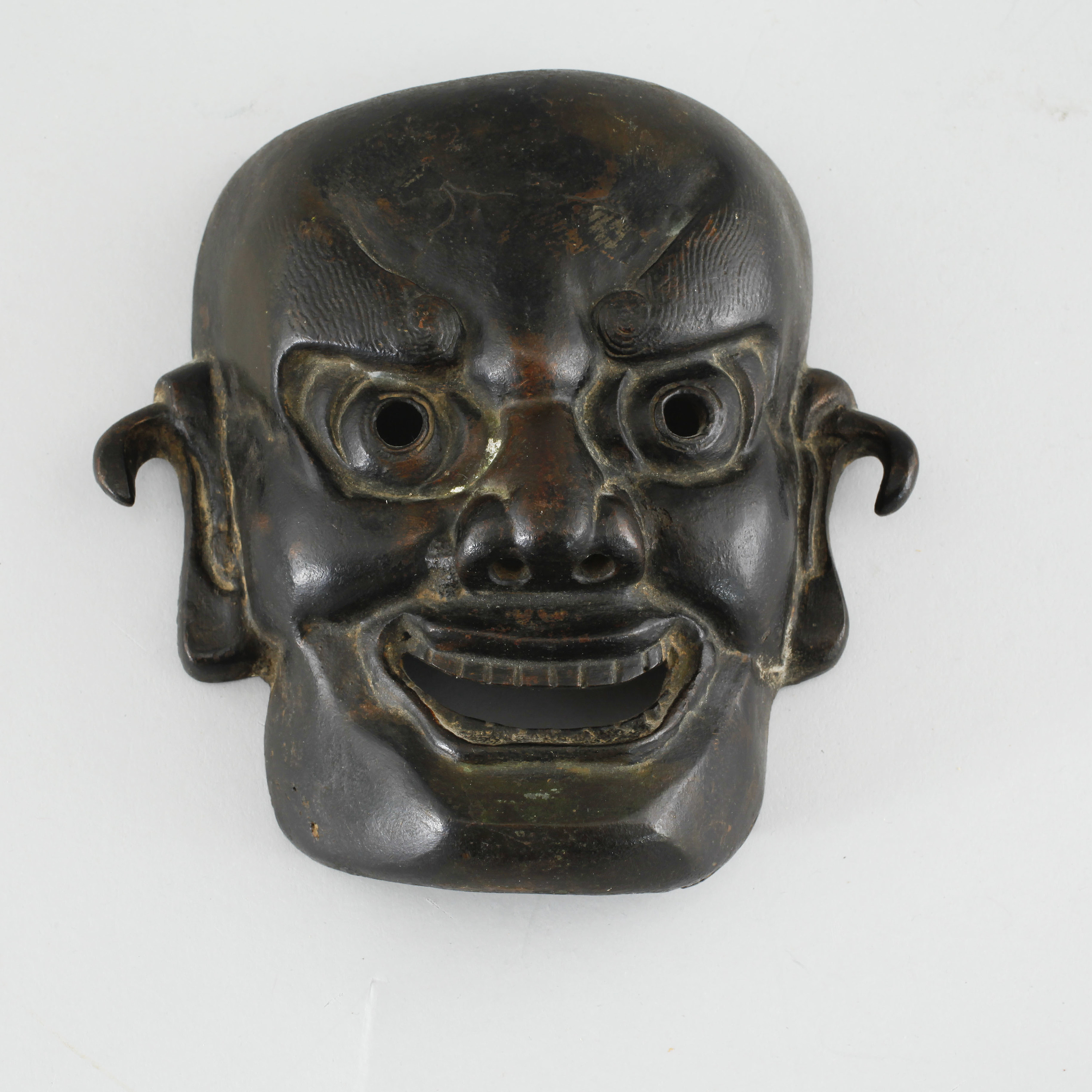A bronze mask from Japan, Meiji (1868- 1912). - Bukowskis
