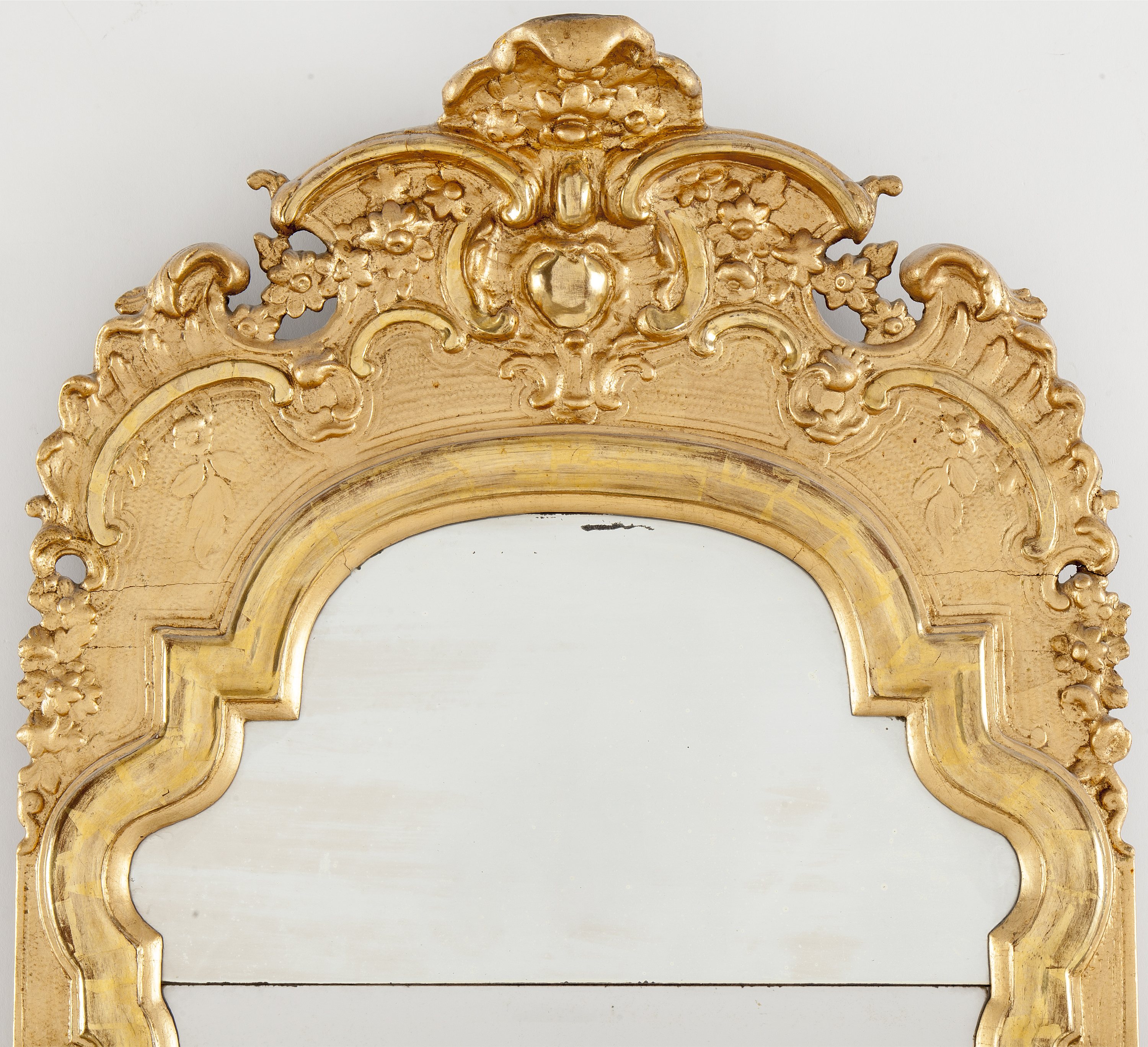 An early 18th century bronzed Rokoko mirror. - Bukowskis