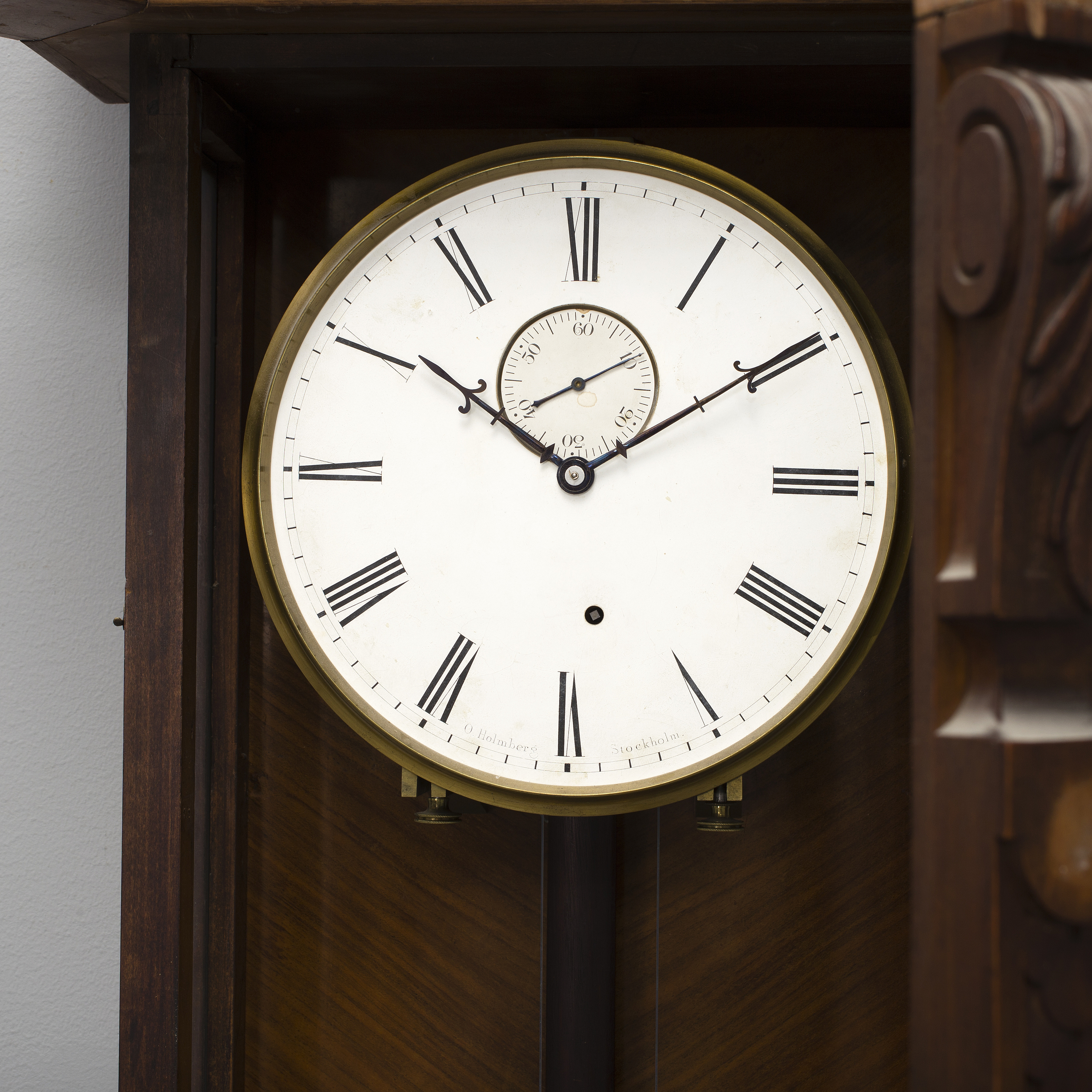 A late 19th century wall clock, dial marked "O. Holmberg Stockholm ...