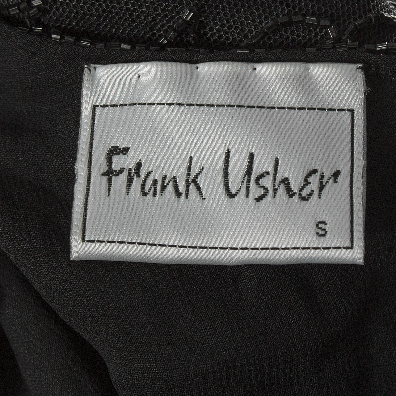 A Frank Usher blouse and trousers, size S/38. - Bukowskis