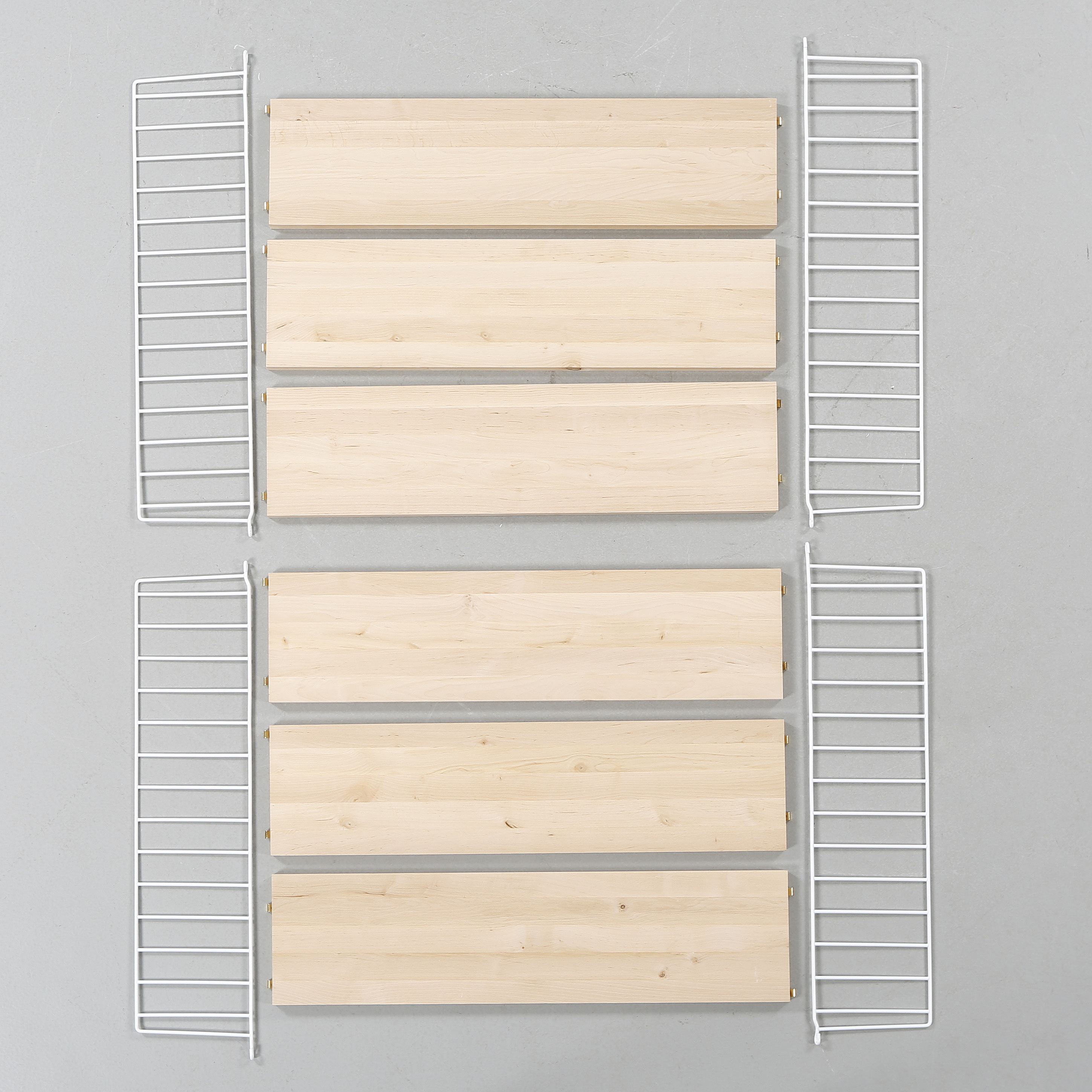 A pair of "String" shelves by Nils Strinning, 21th century. - Bukowskis