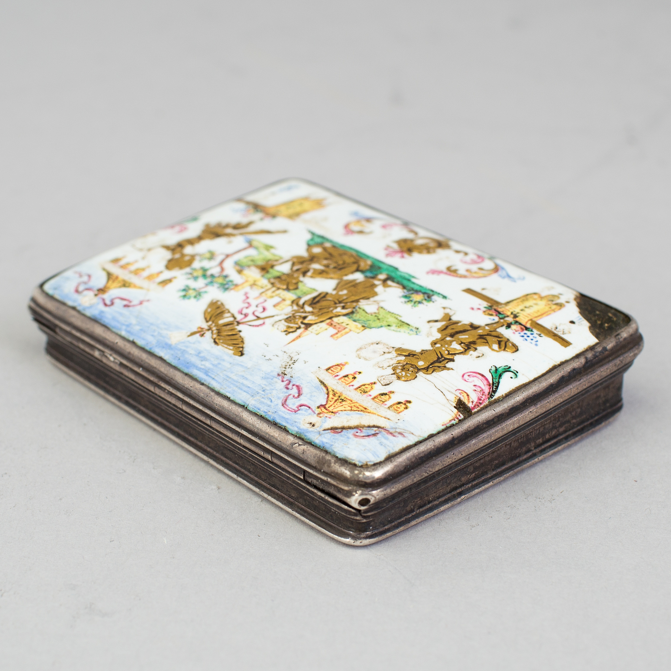 A silver box decorated in enemel with gilt details, presumably Pierre ...