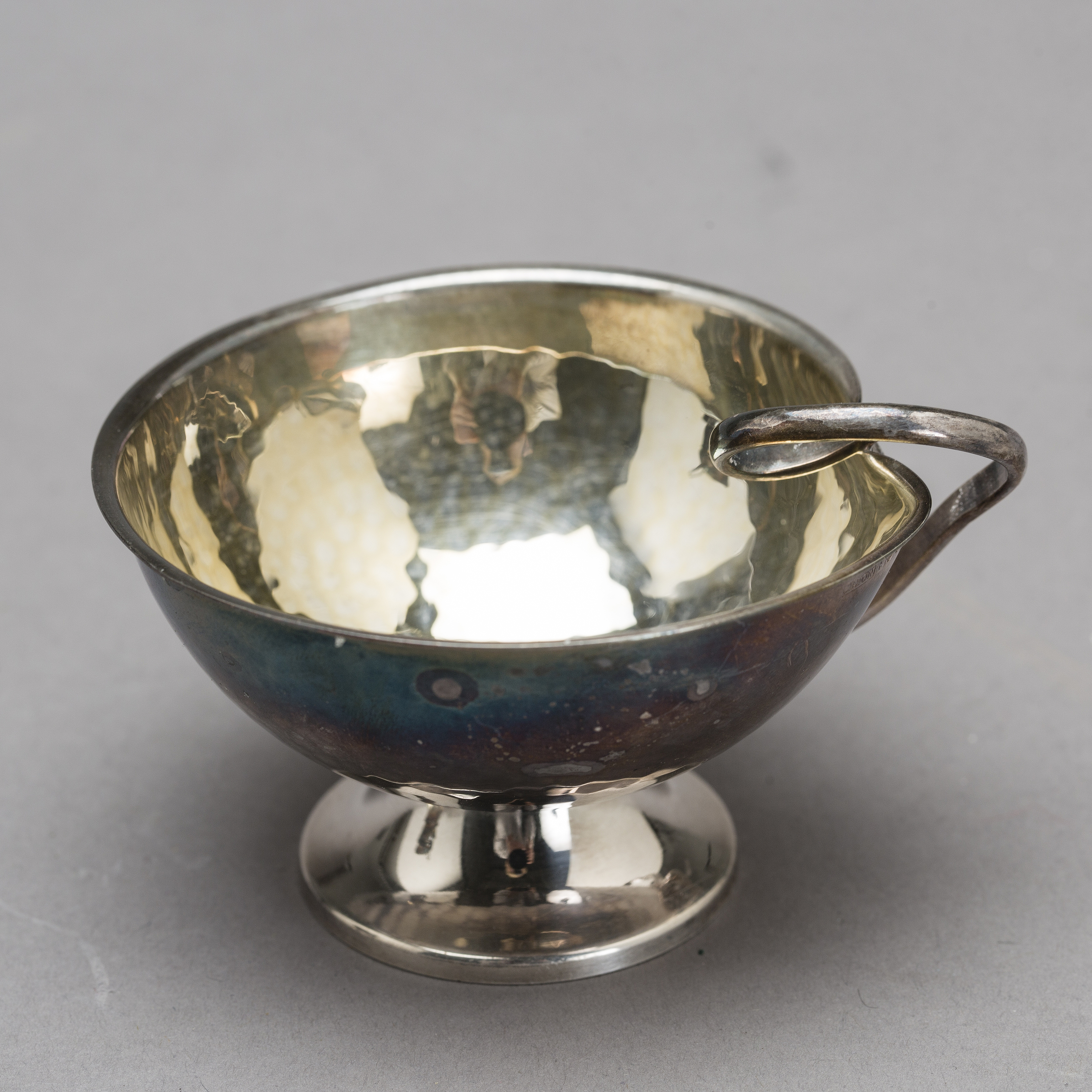 A set of 14 silver punch mugs, 1975. - Bukowskis