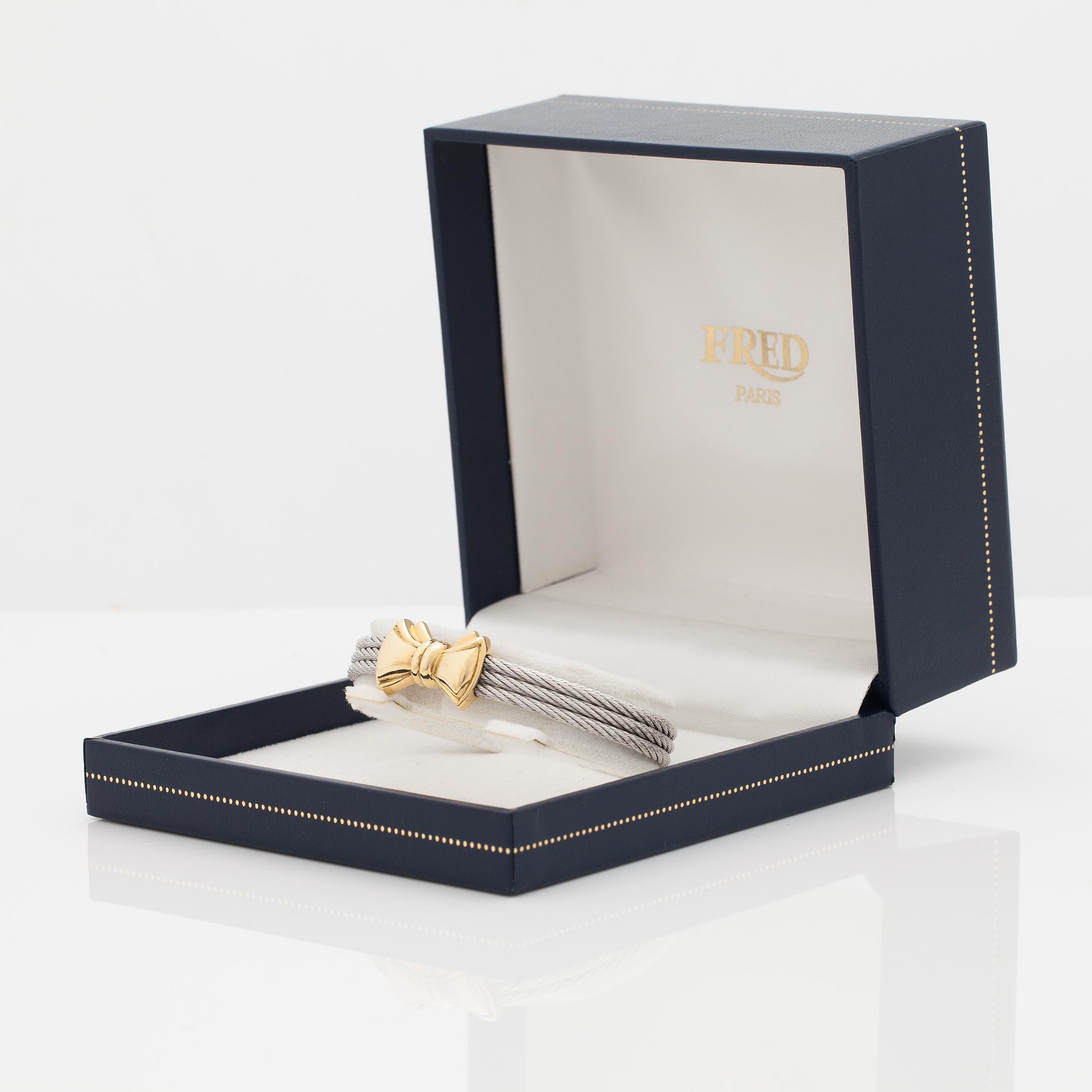 A Fred Paris "Force 10" bangle and ring. - Bukowskis