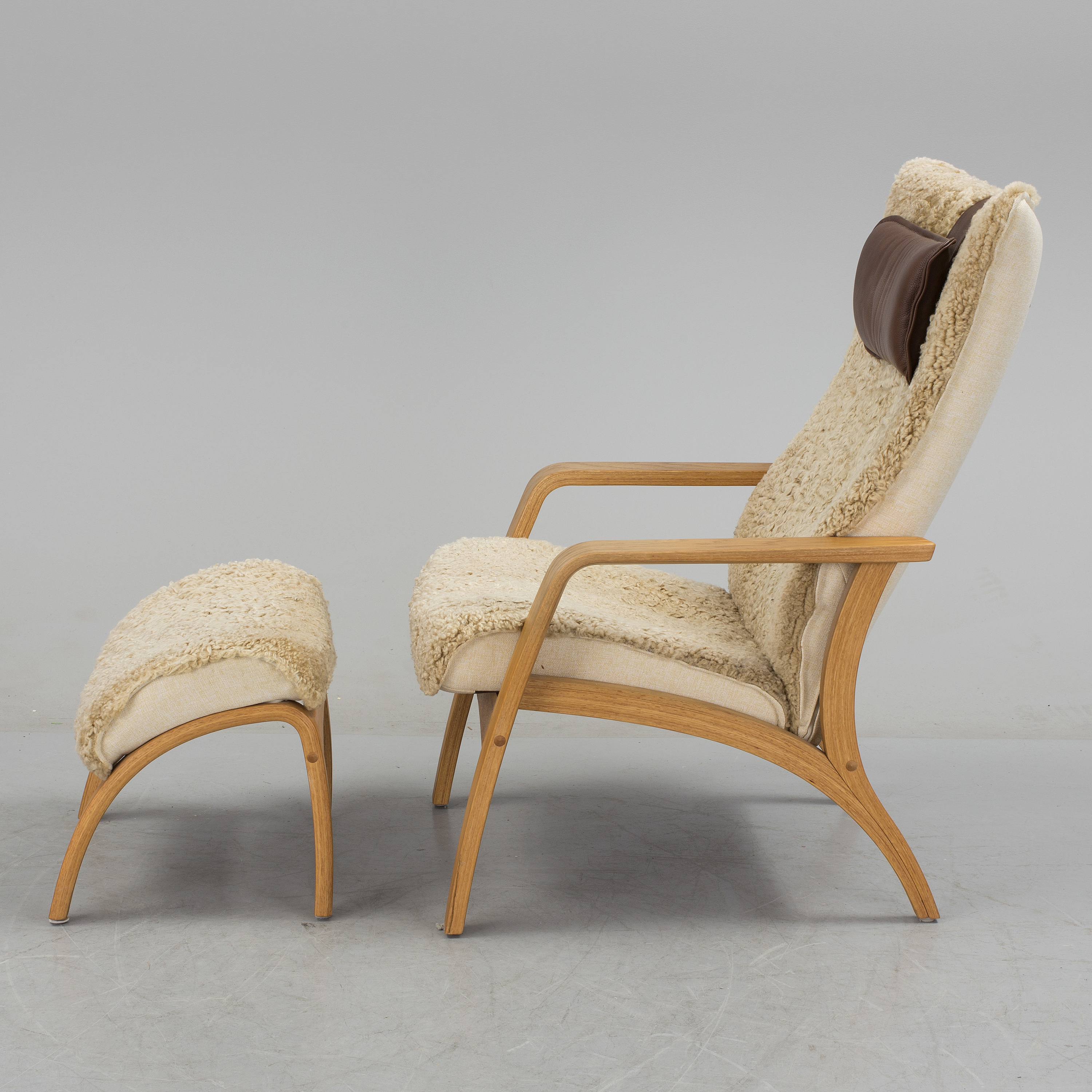 An armchair and stool "Delta Adventure", Brunstad, Norway. - Bukowskis