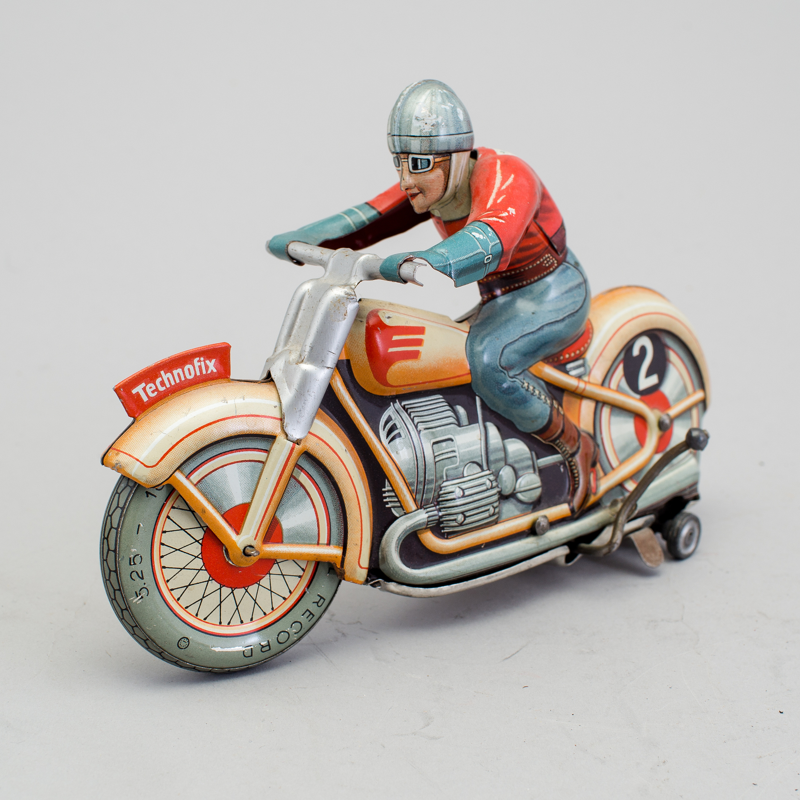 A Technofix tinplate Trick motorcycle, Germany, ca 1950. - Bukowskis