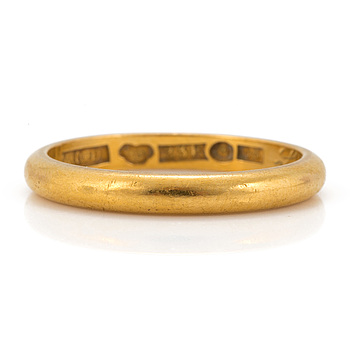 A 23K gold ring. - Bukowskis