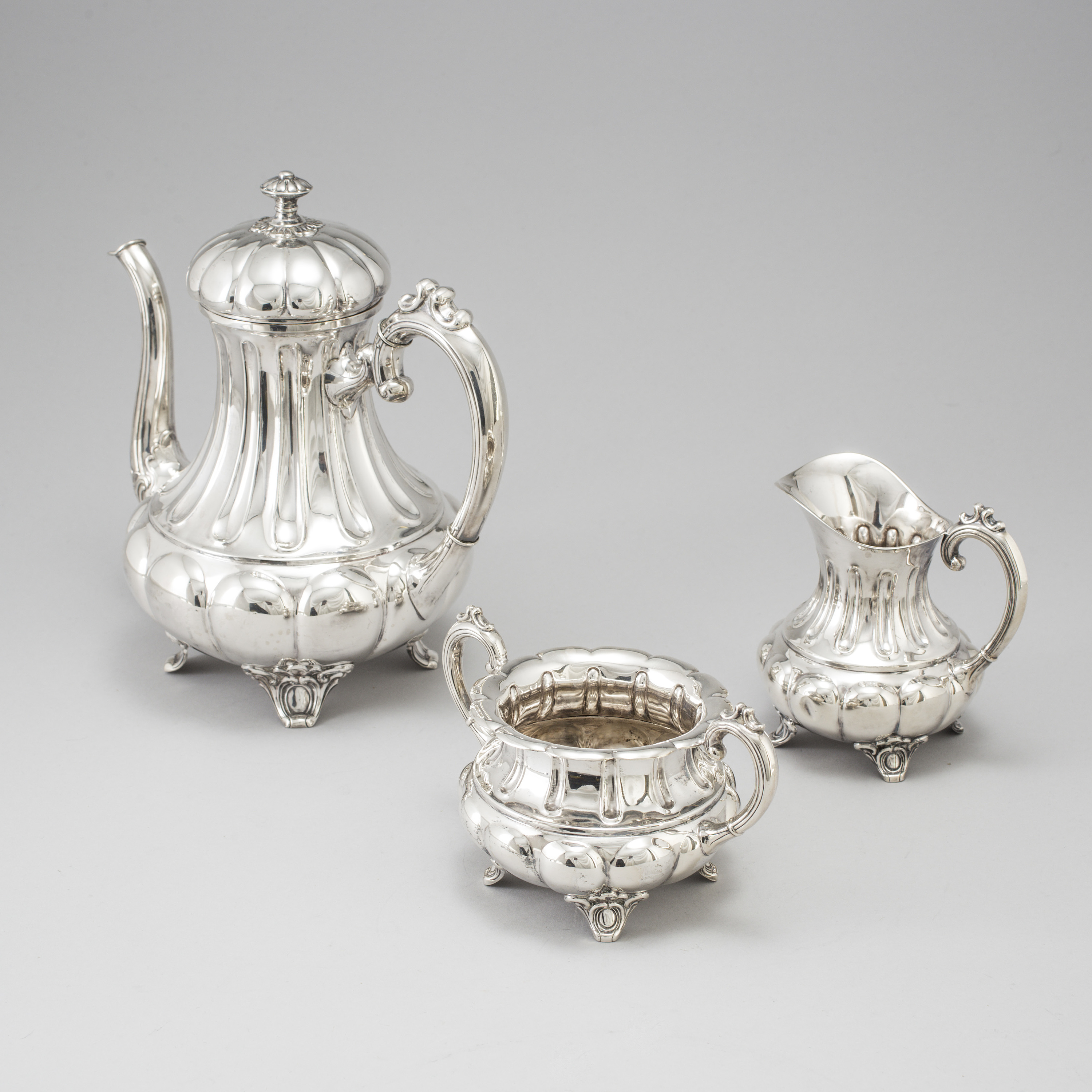 A THREE PIECE SILVER COFFEE SERVICE, first half of the 20th century ...
