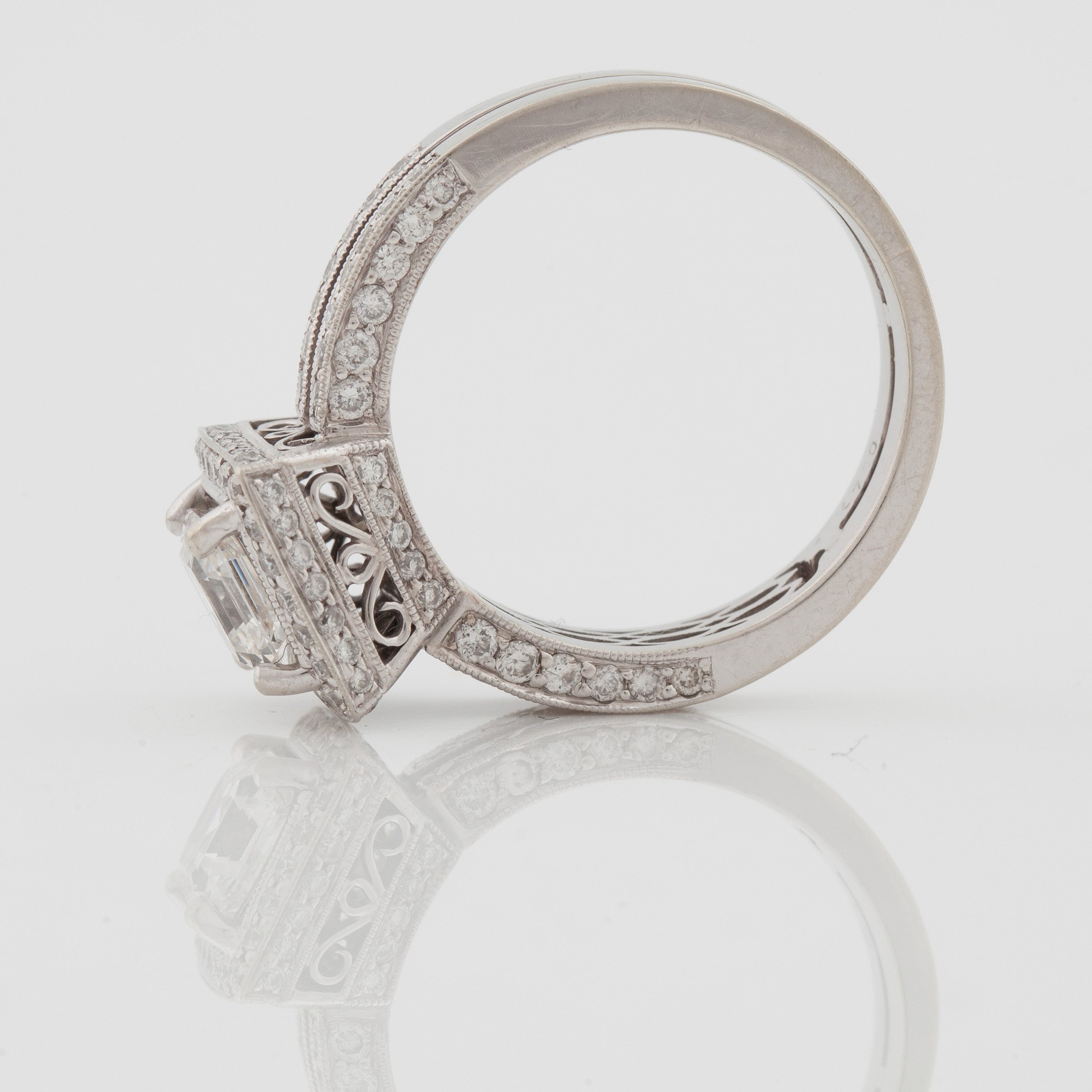 A 1.04 ct Assher cut diamond, quality F/VS1, ring. Shan with pavé set ...