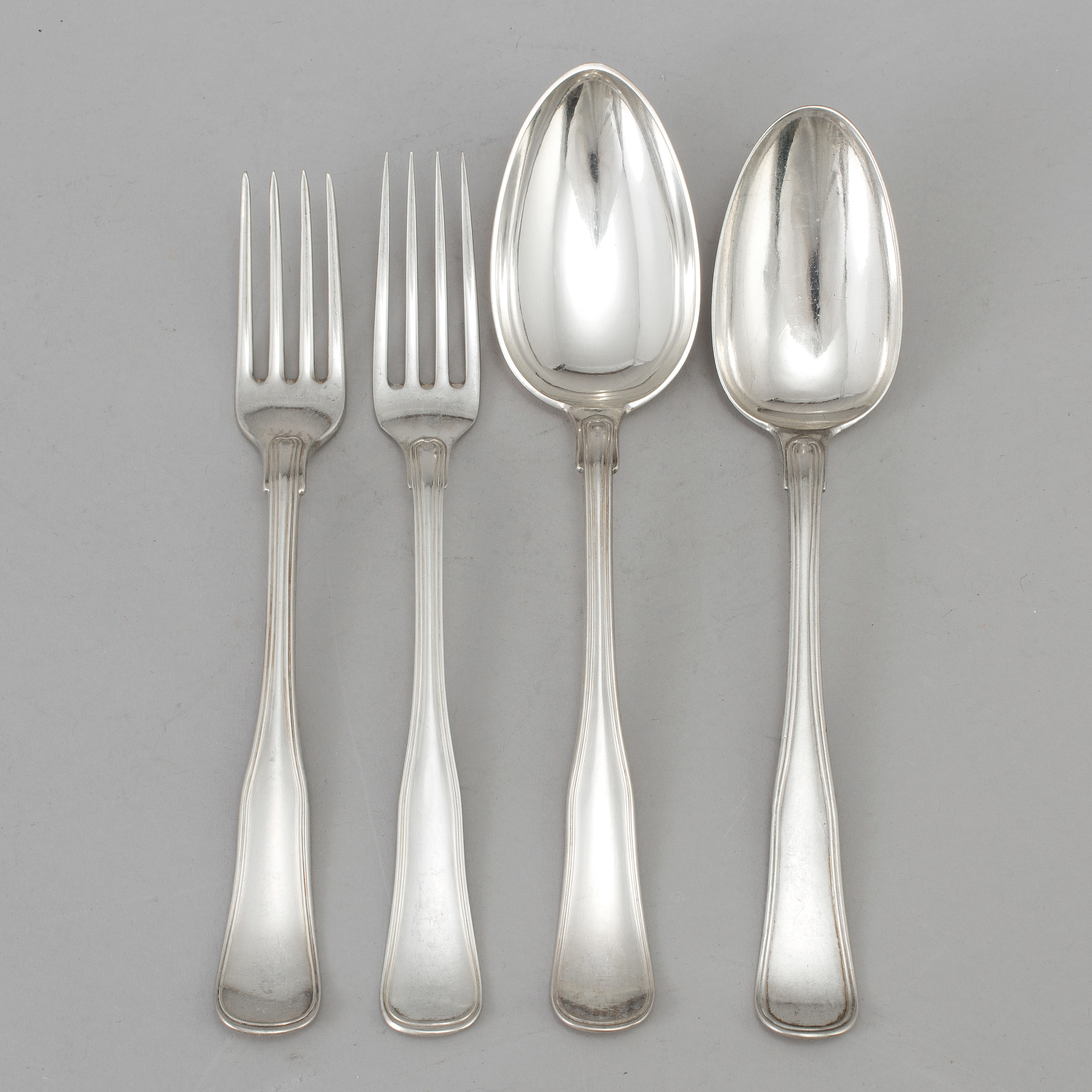 A set of twelve forks and four spoons, silver, maker's mark Arendt ...