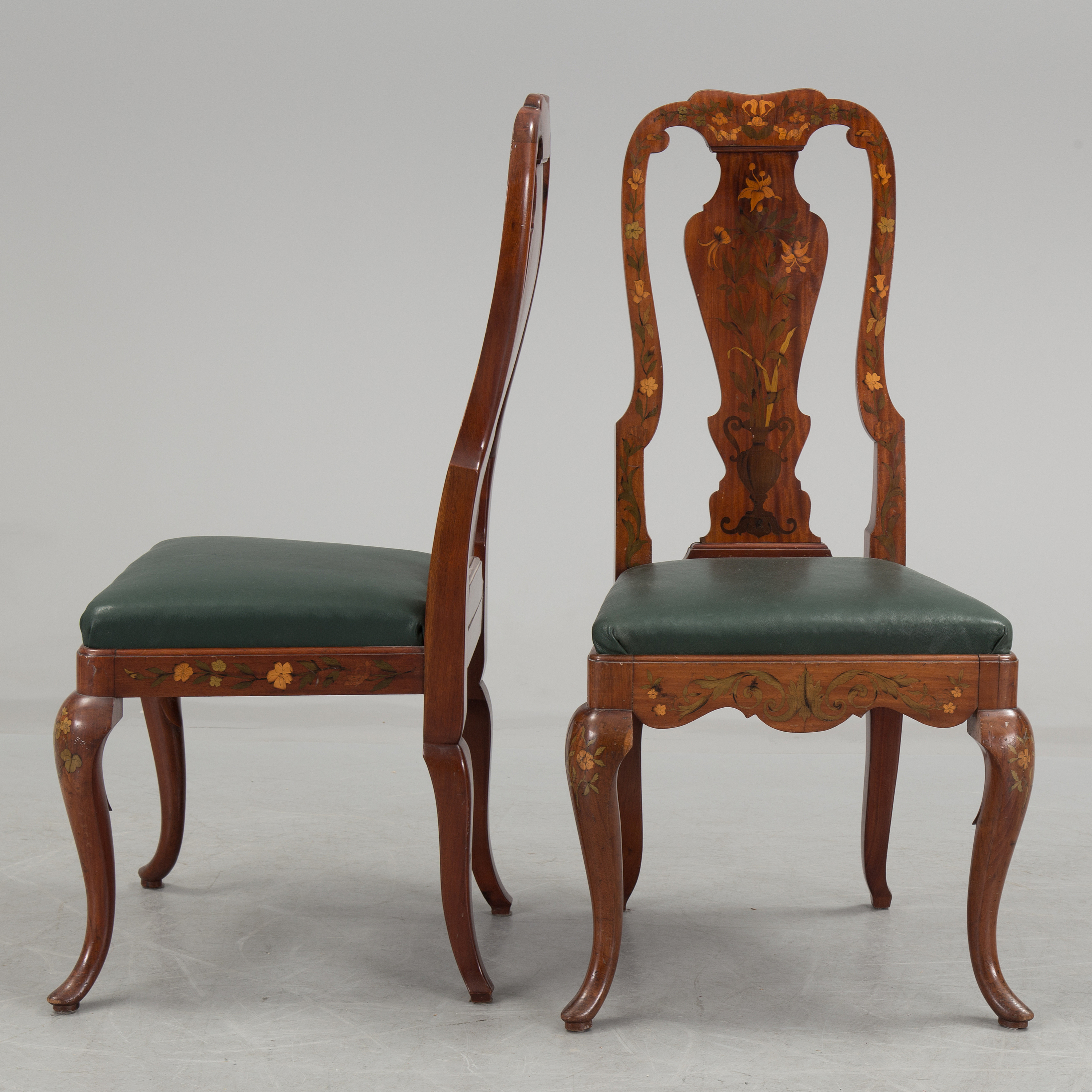 A pair of dutch rococo style chairs, first half of the 29th century ...