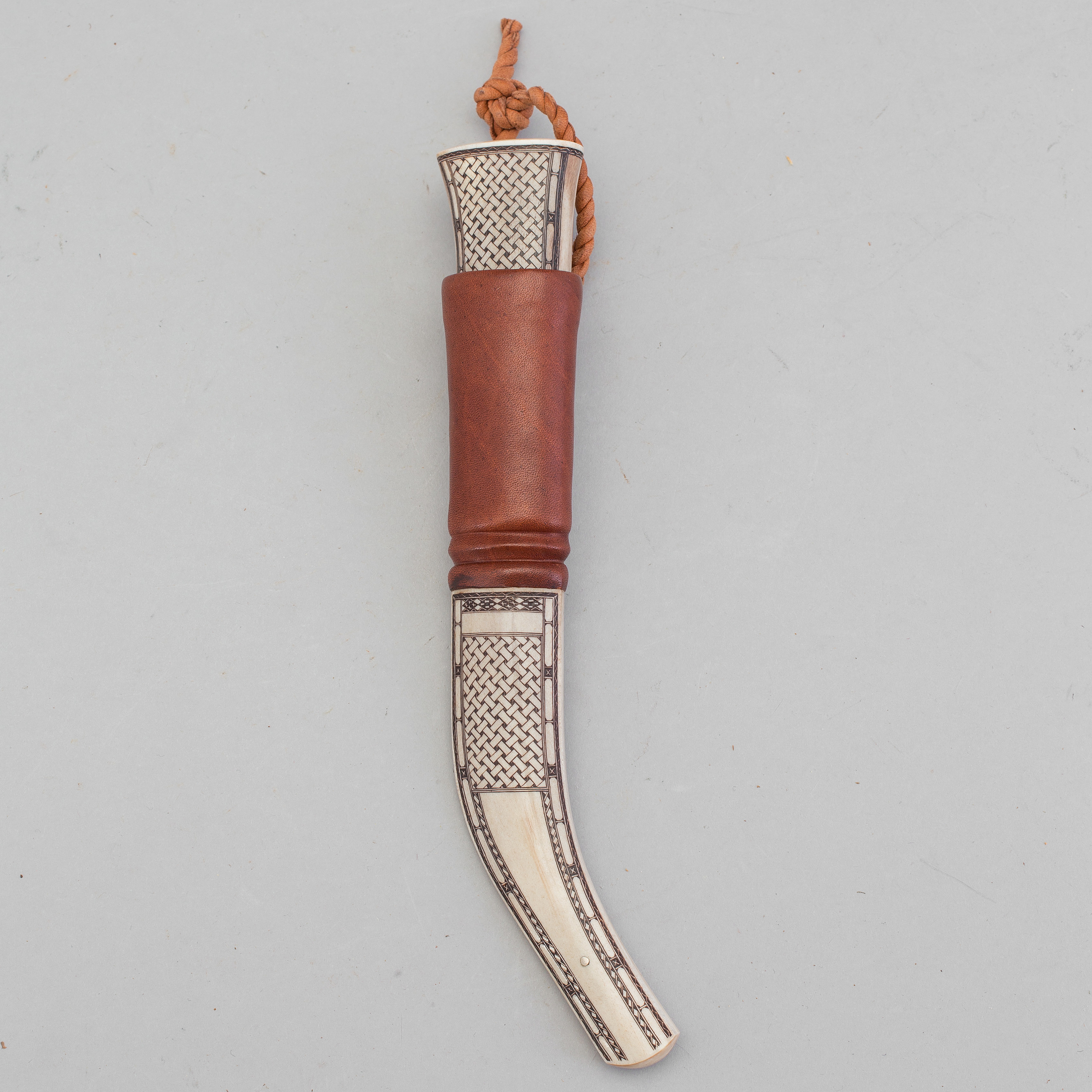 A traditional sami knife by Kay Isaksson in Lycksele. Signed with ...