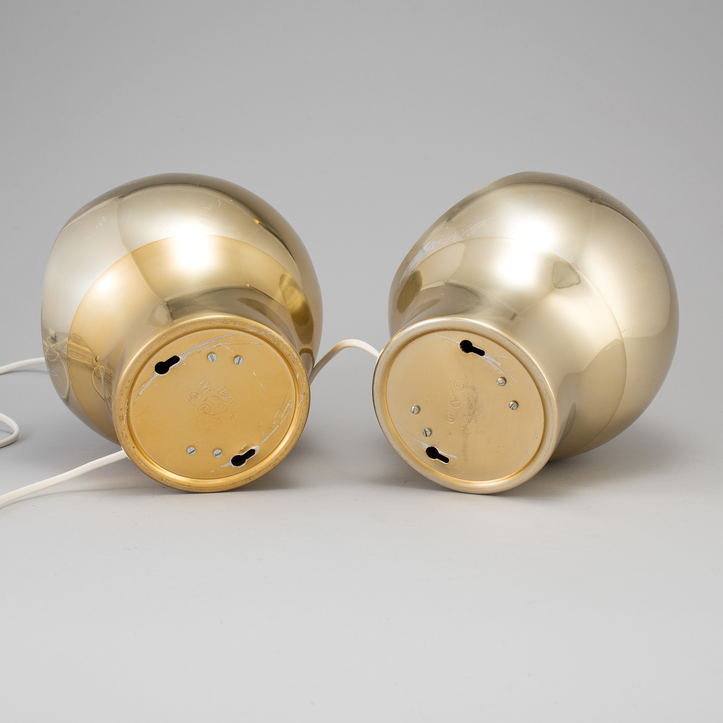 A pair of spherical 1970s wall lights in yellow metal by Swedish ...