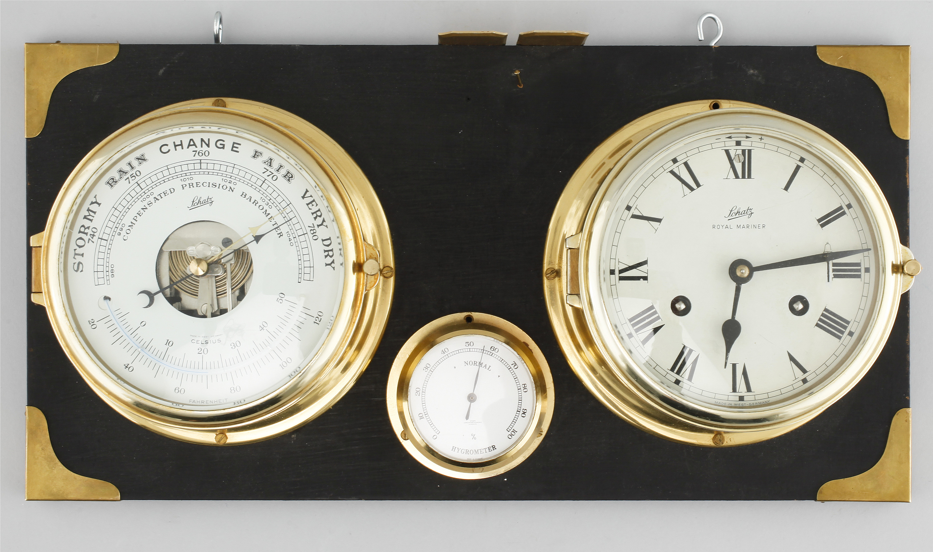 A barometer, clock and a hyglometer, 20th century. - Bukowskis