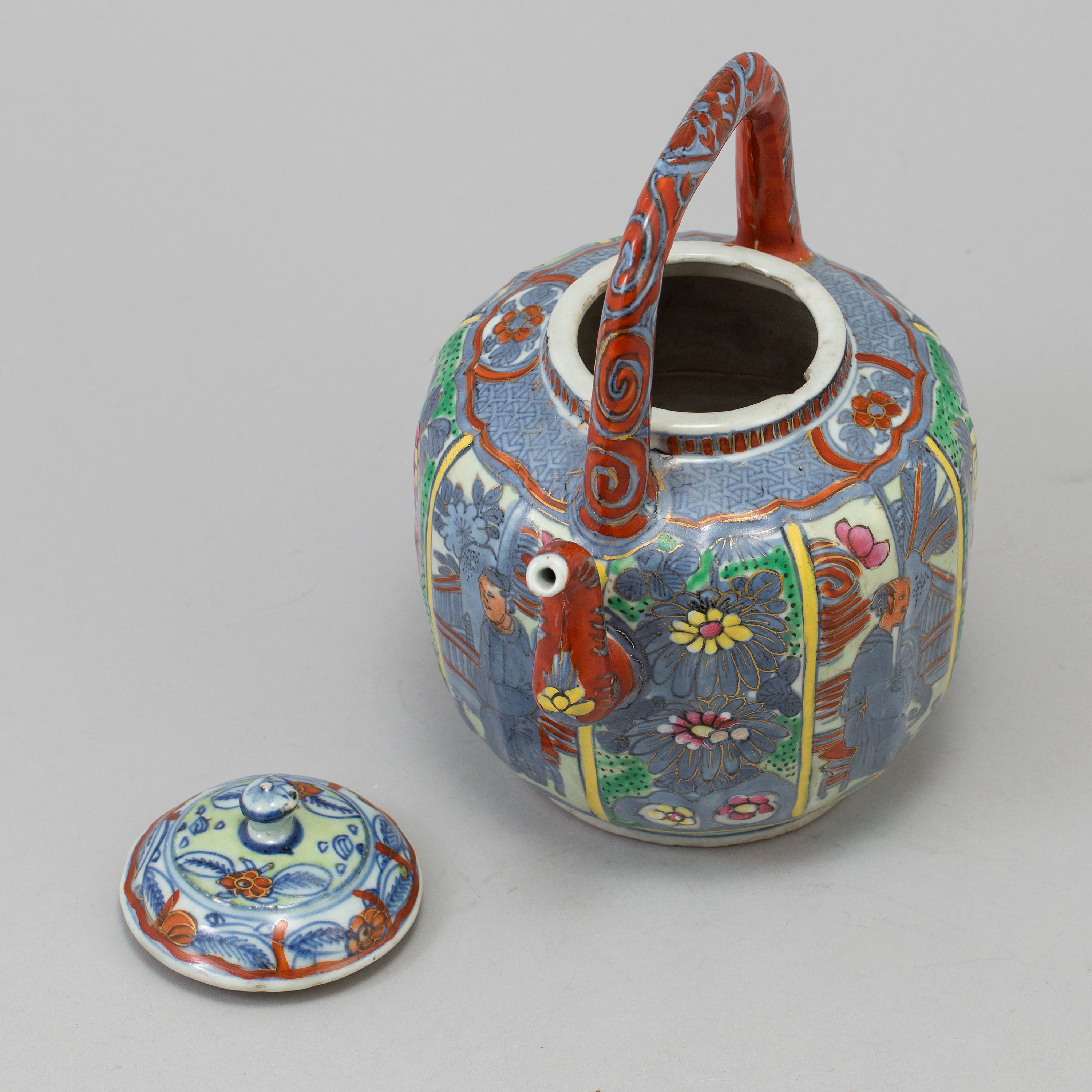 A Chinese kraak blue and white porcelain teapot and cover, Ming dynasty ...